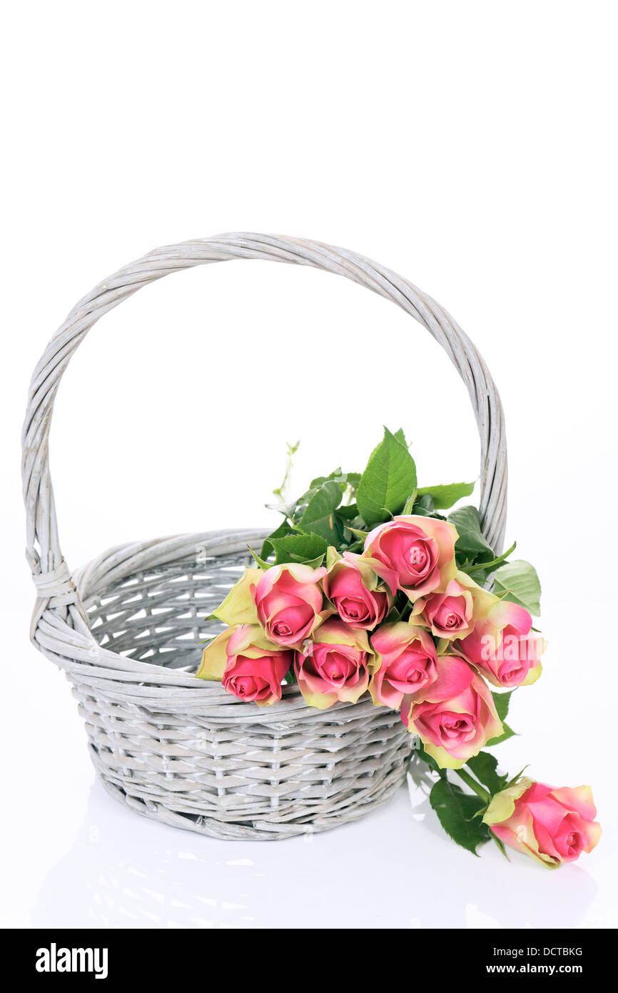 beautiful pink roses in Basket Stock Photo - Alamy