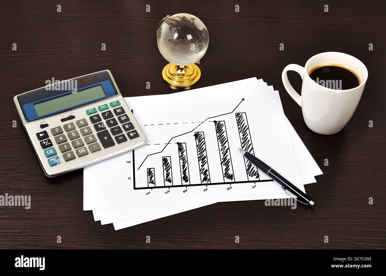 Workplace with chart Stock Photo - Alamy