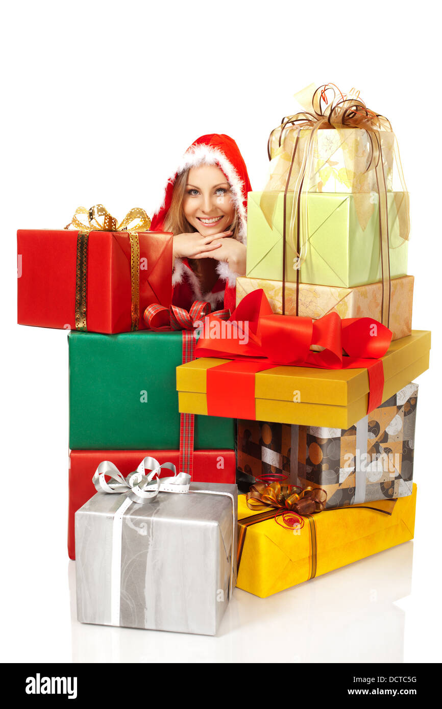 Female smiling pile christmas boxes Stock Photo - Alamy
