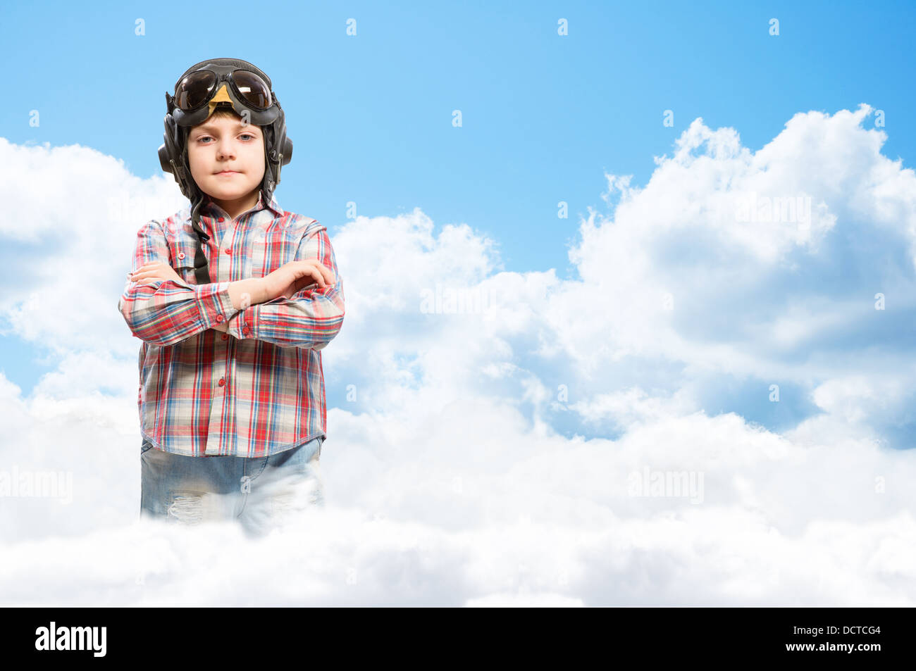 Boy in helmet pilot dreaming of becoming a pilot Stock Photo - Alamy