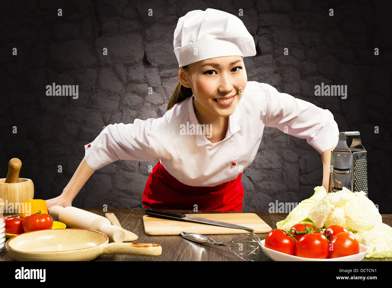Portrait Asian woman cooks Stock Photo - Alamy
