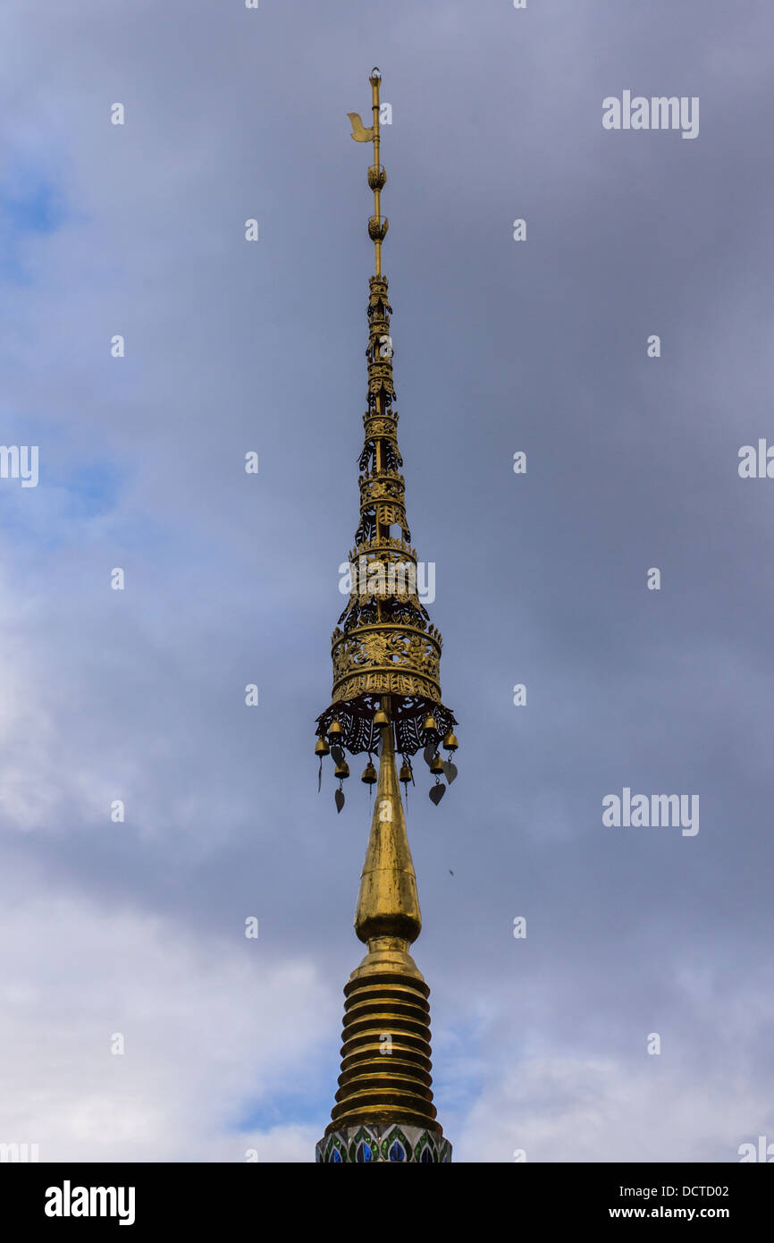 Thai chedi over blue sky Stock Photo - Alamy