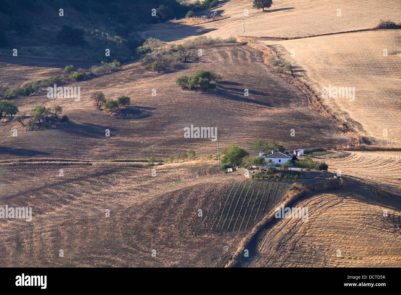 Spanish villa and plowed fields Stock Photo - Alamy