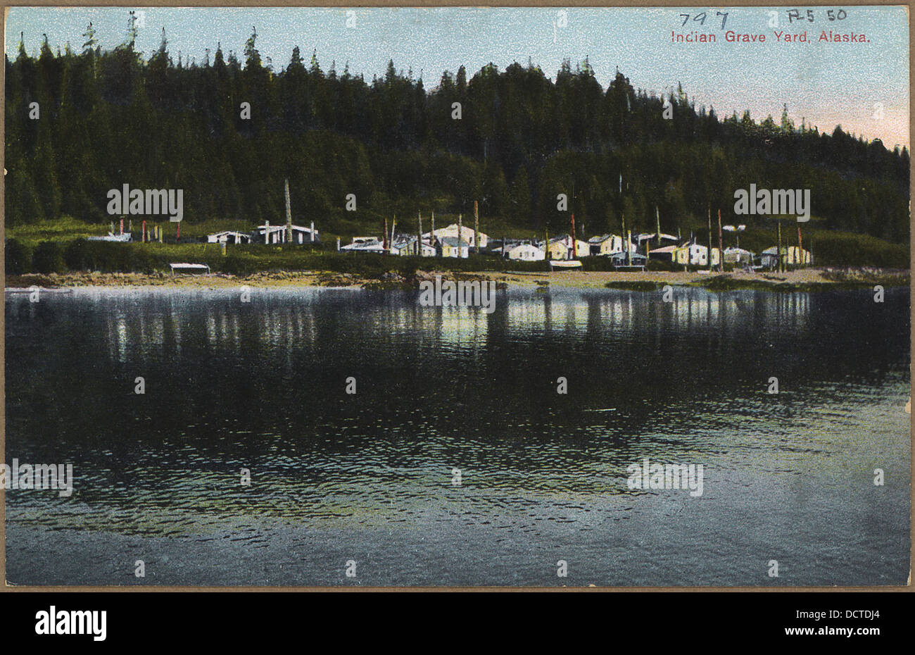 A color postcard depicting an Indian graveyard in Alaska, showcasing ...