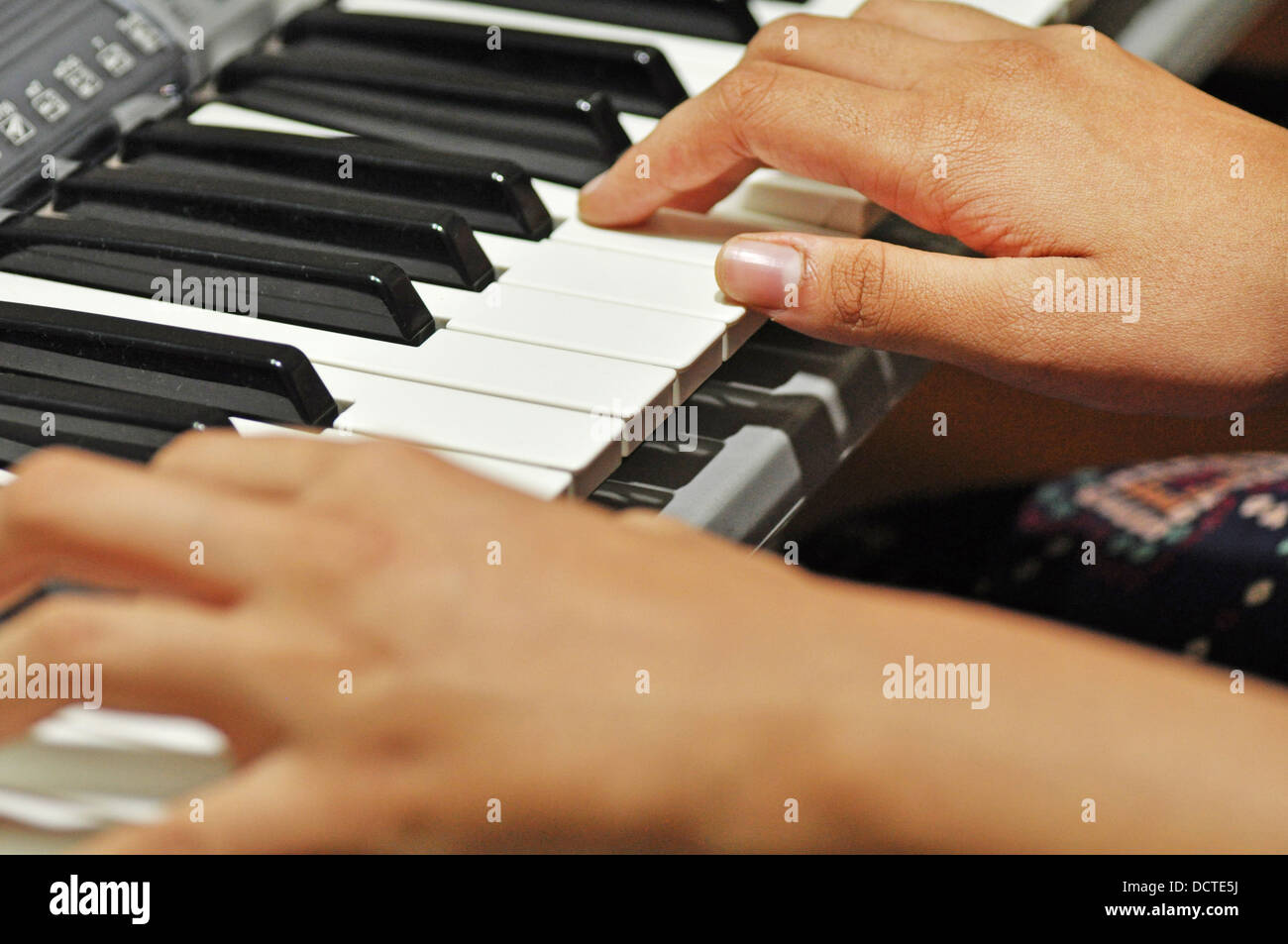 Woman keyboard play High Resolution Stock Photography and Images - Alamy
