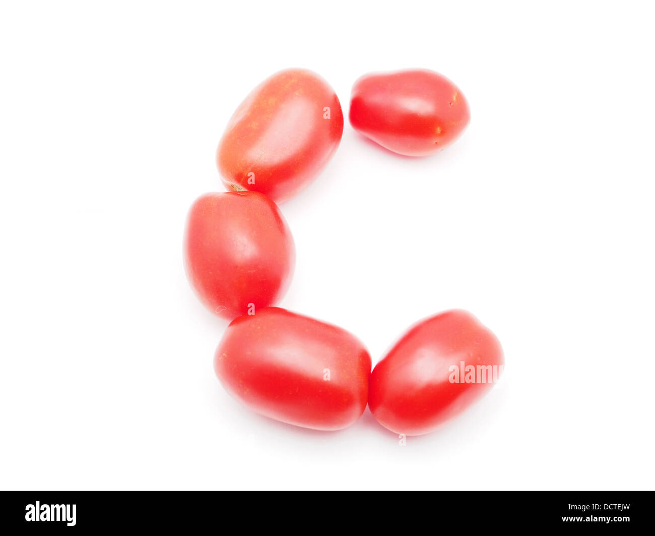 The letter of tomato on white background Stock Photo - Alamy