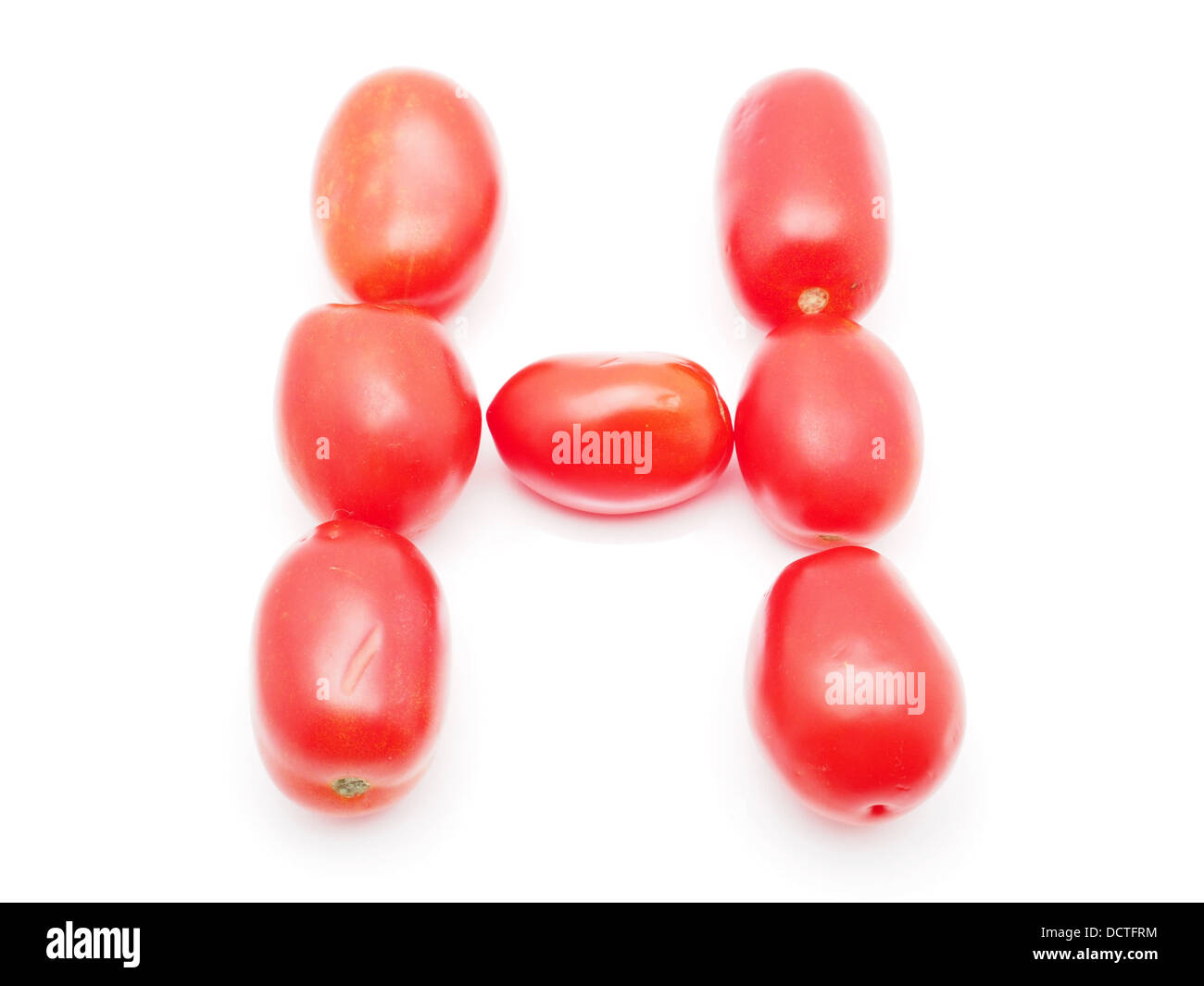 The letter of tomato on white background Stock Photo - Alamy