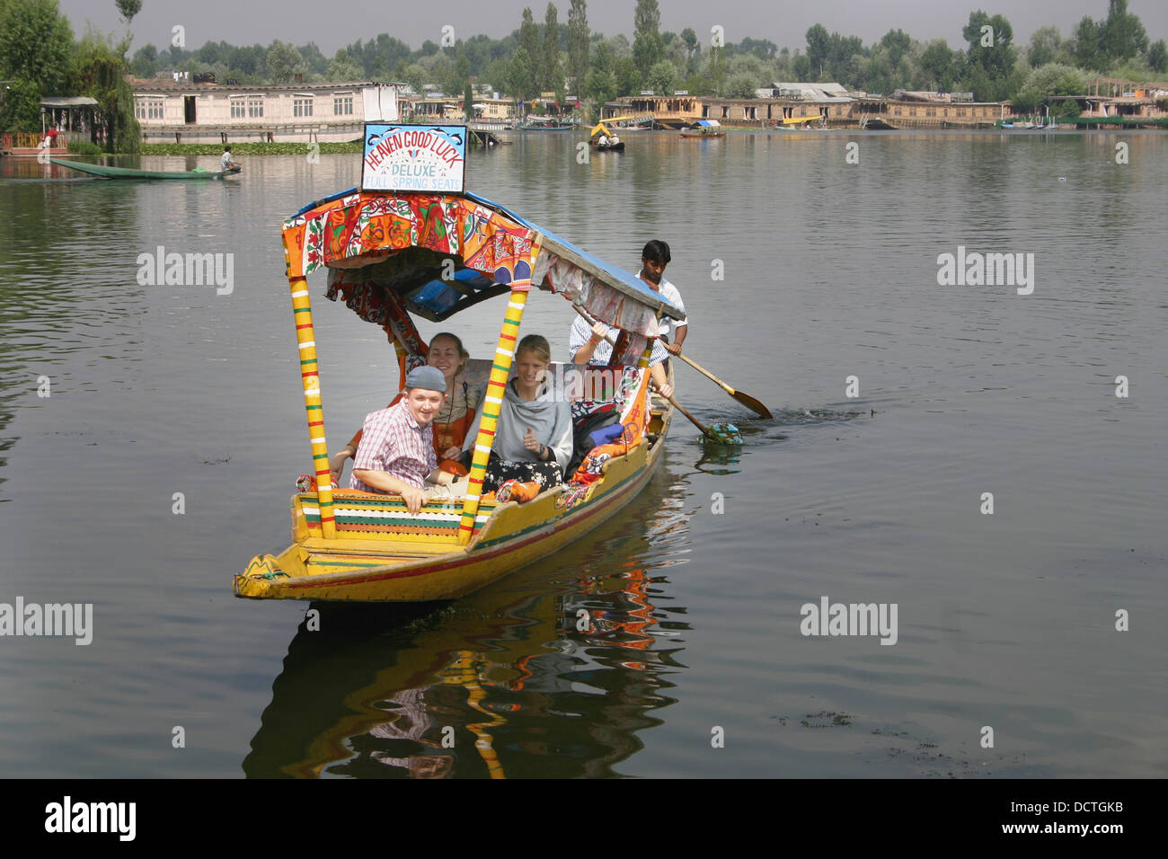 Tourists Riding In Covered Boat Stock Photo - Alamy