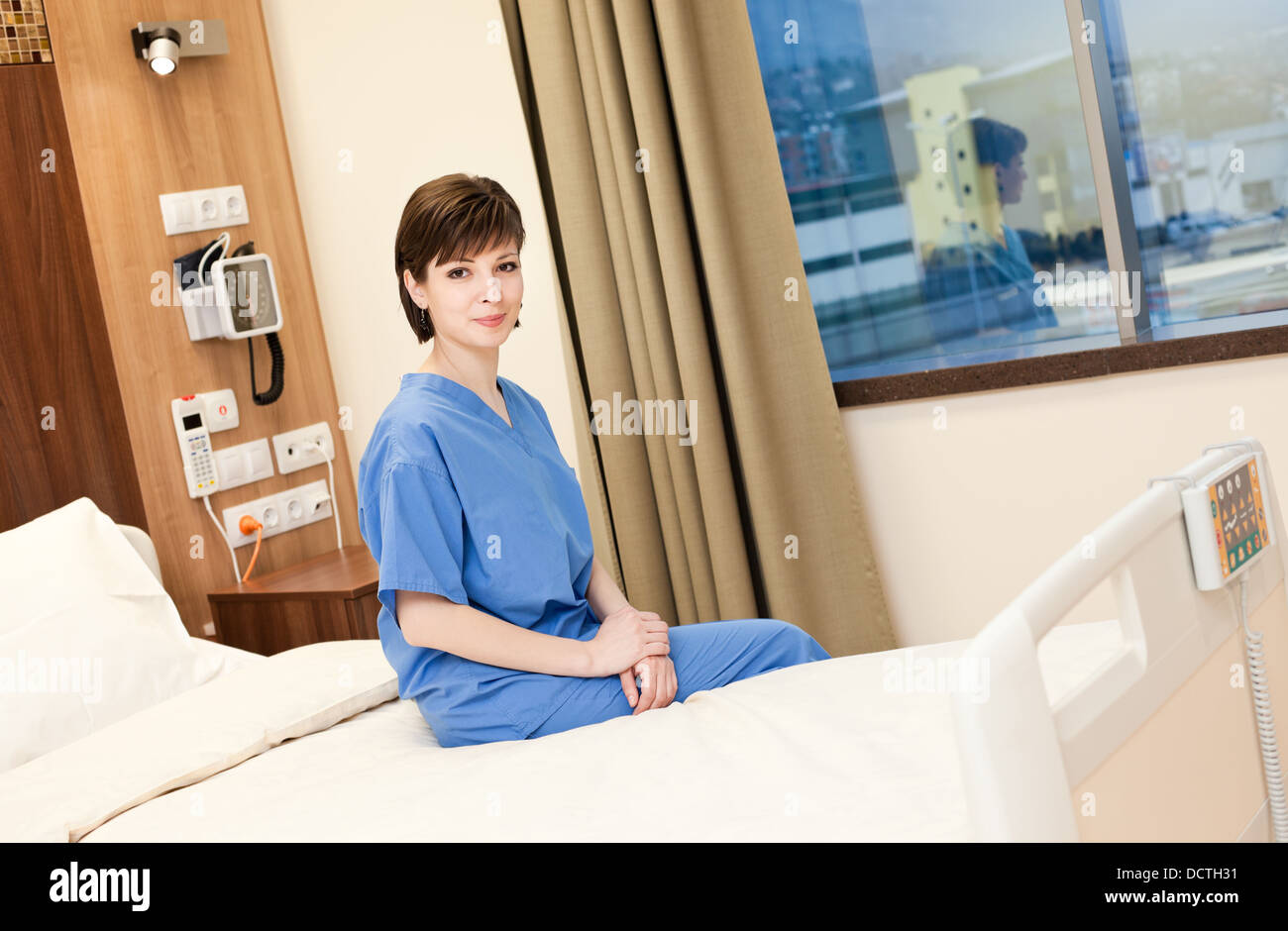 Female patient hospital bed Stock Photo - Alamy