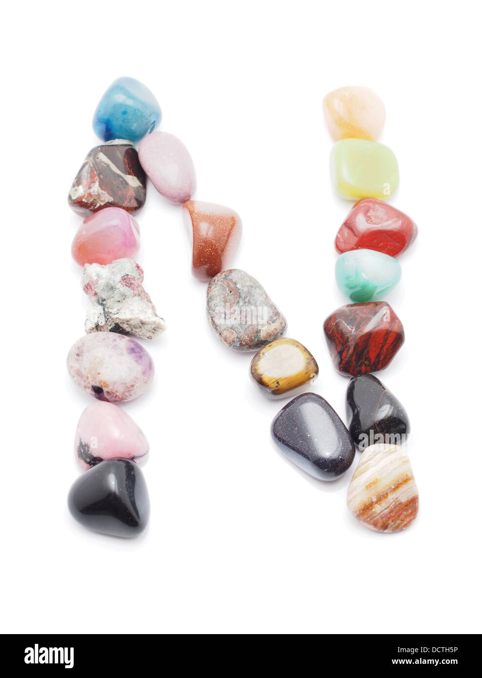 letter from minerals on a white background Stock Photo - Alamy