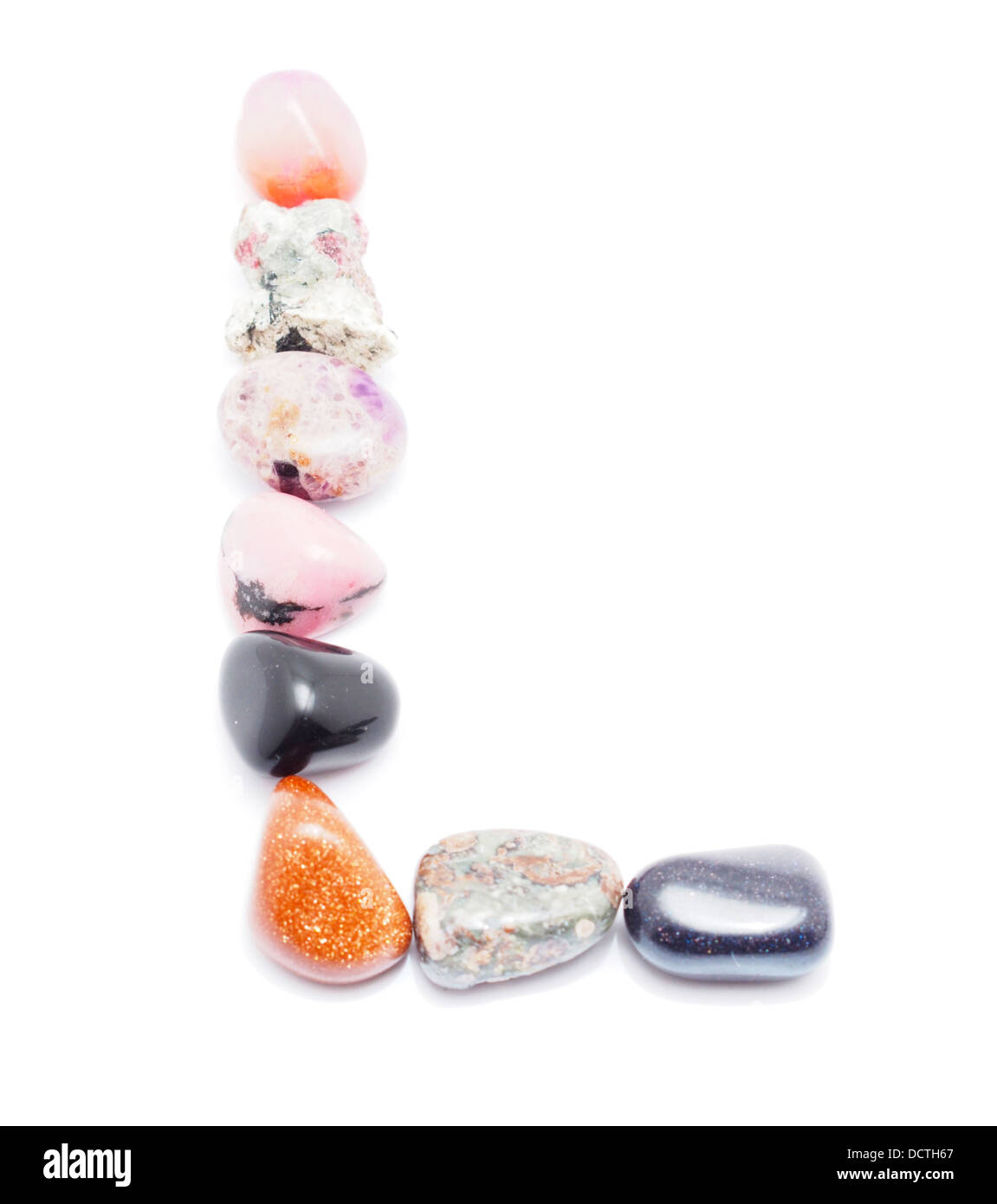 letter from minerals on a white background Stock Photo - Alamy