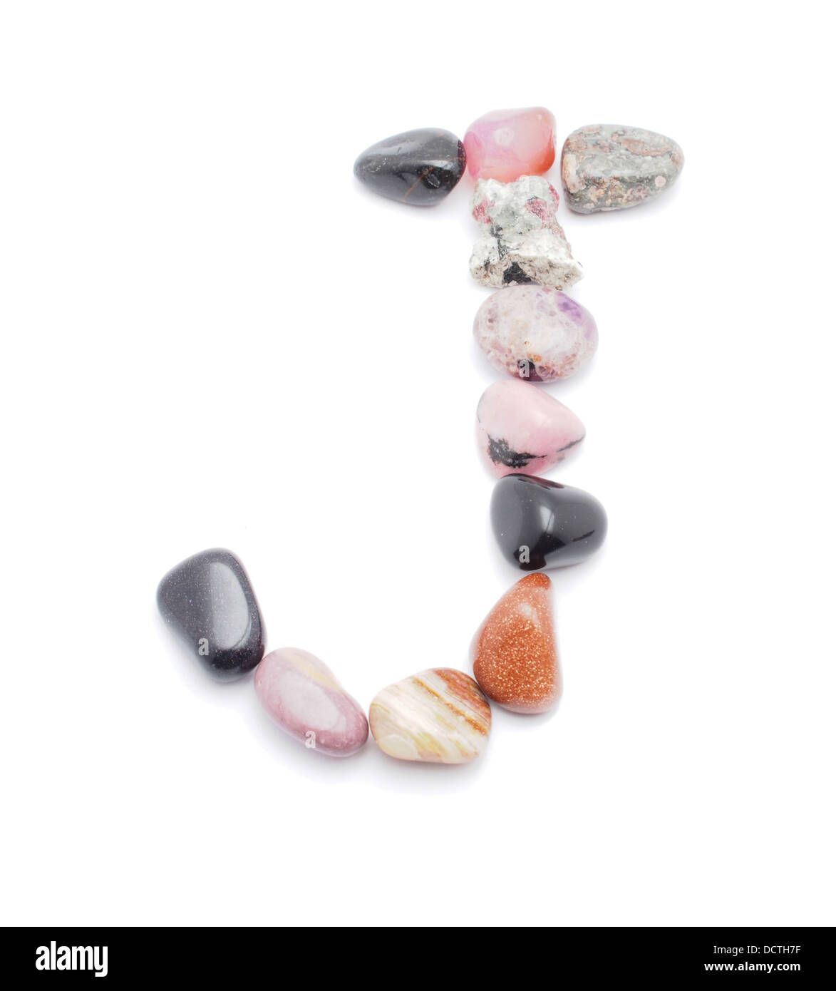 letter from minerals on a white background Stock Photo - Alamy