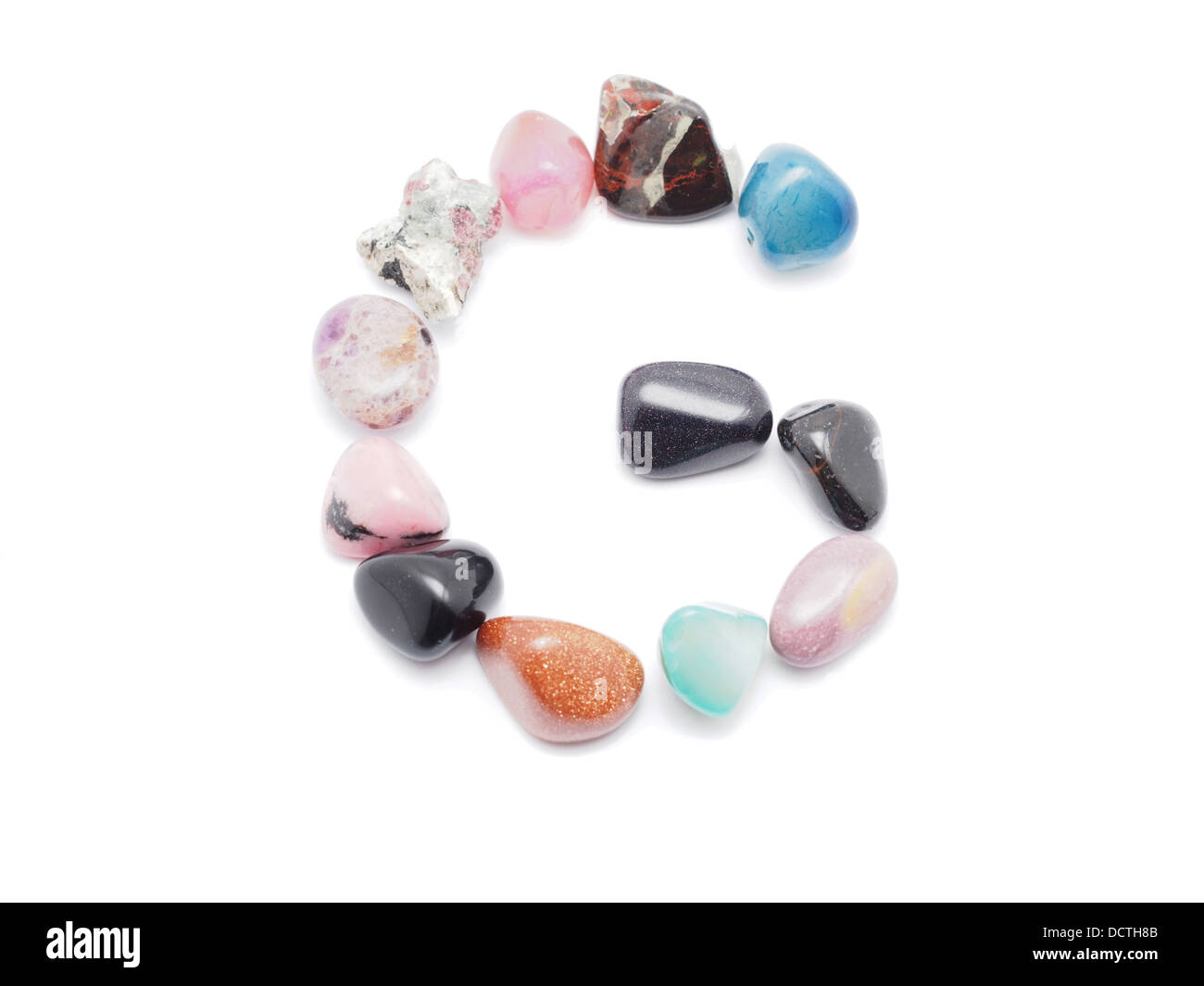 letter from minerals on a white background Stock Photo - Alamy