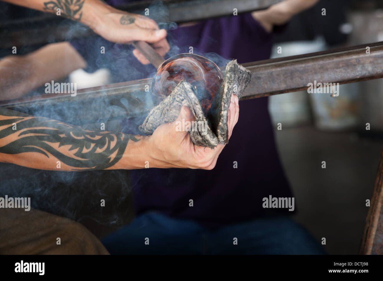 Cooling Glass Art with Mitts Stock Photo - Alamy