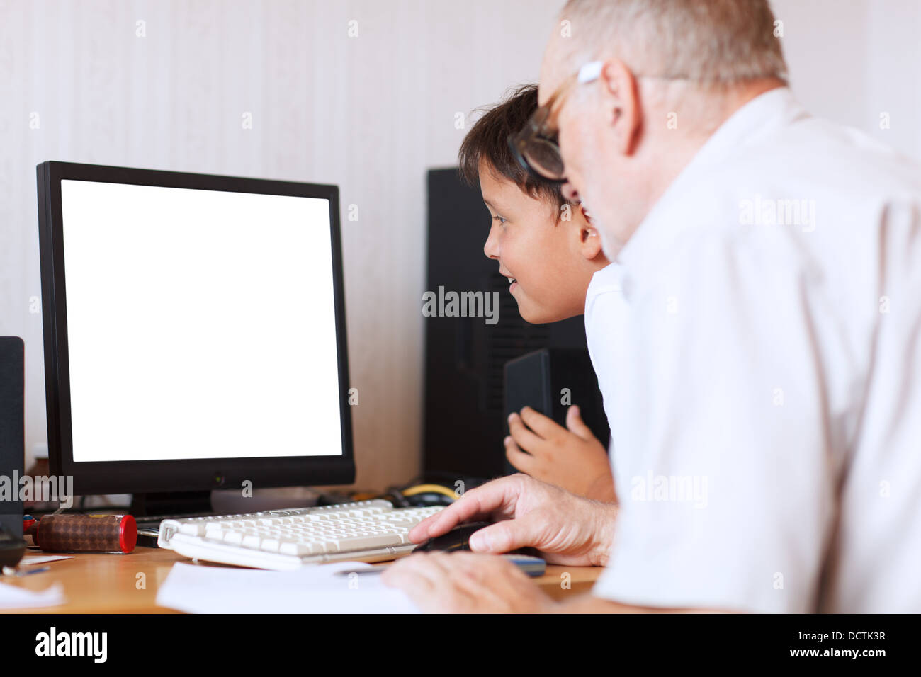 Grandfather grandson computer hi-res stock photography and images - Alamy