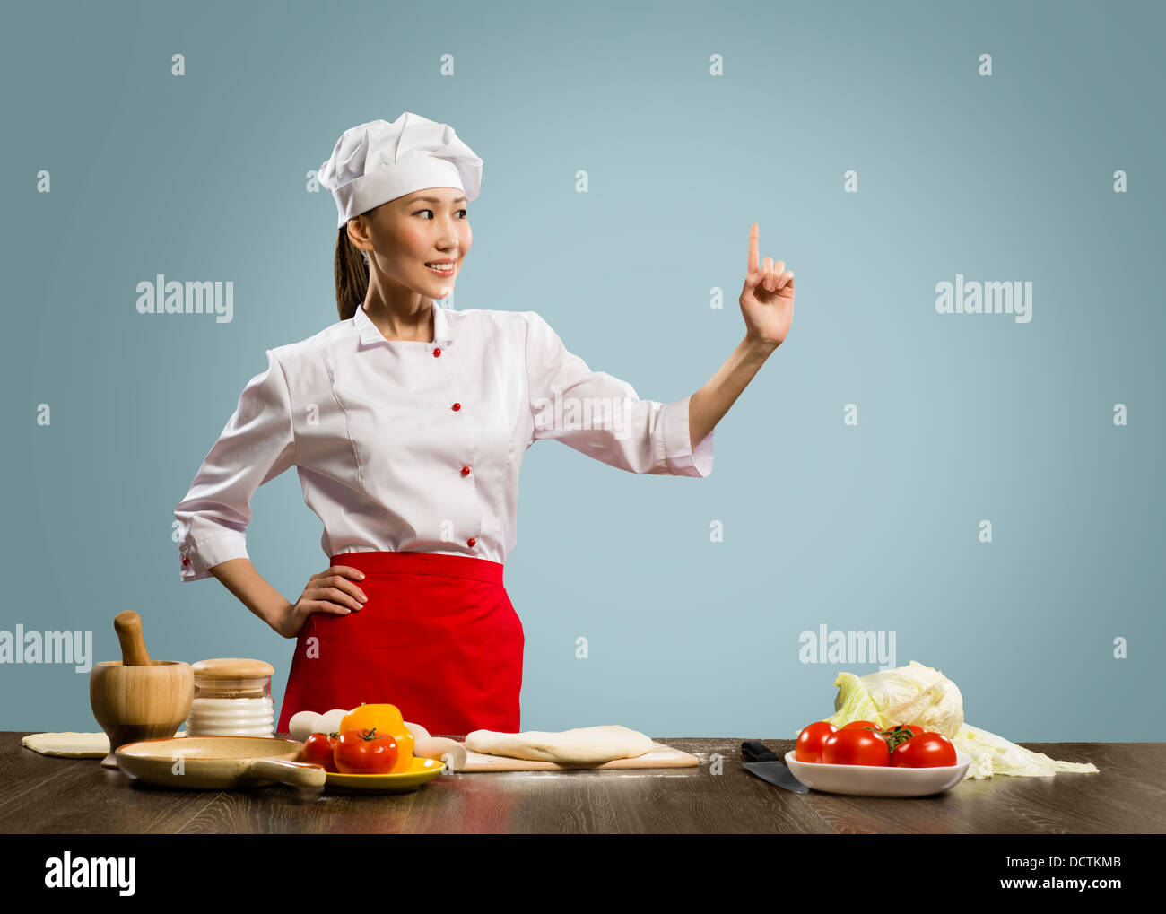 Asian female cooking dinner hi-res stock photography and images - Alamy