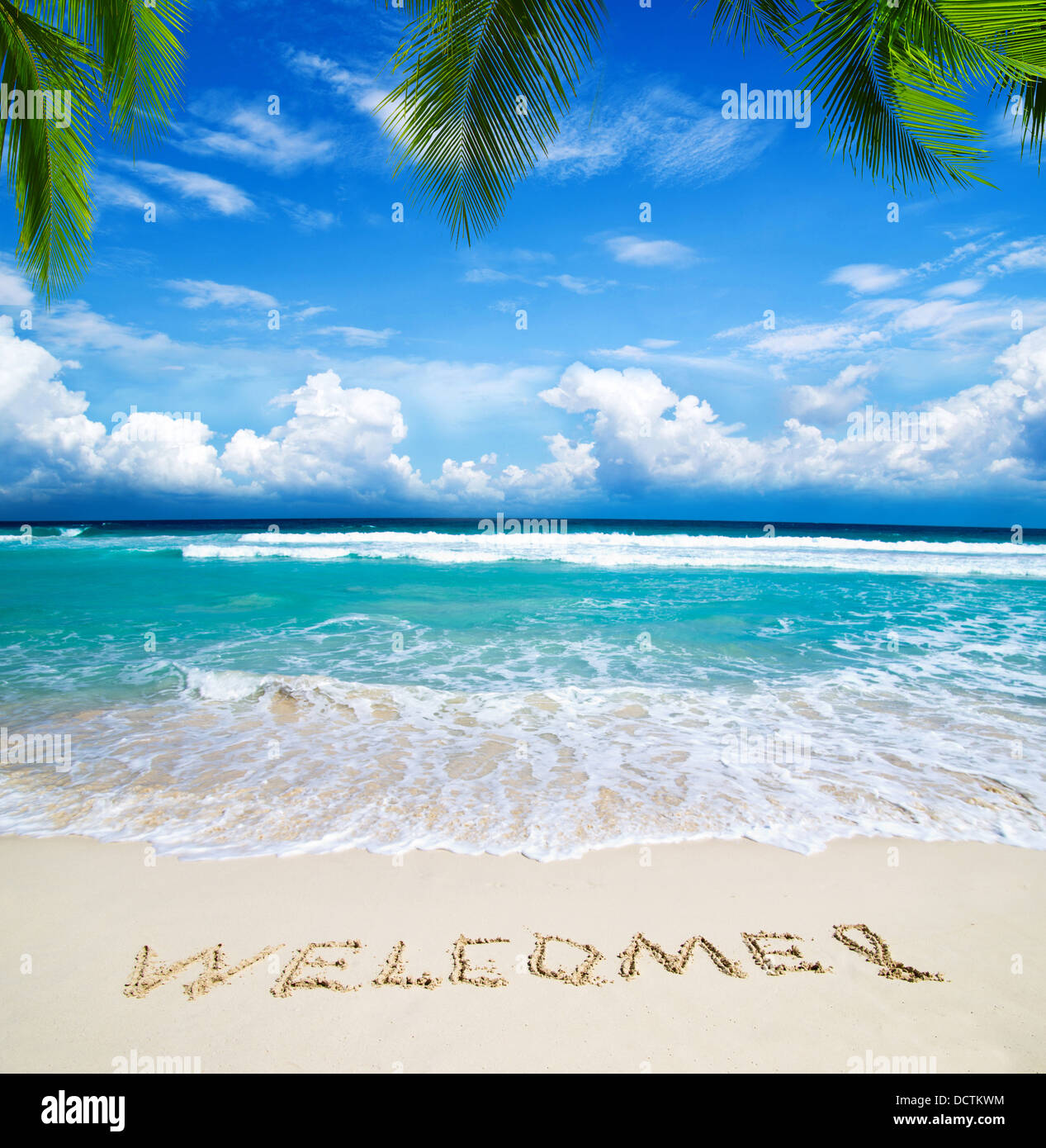 welcome written in beach Stock Photo - Alamy