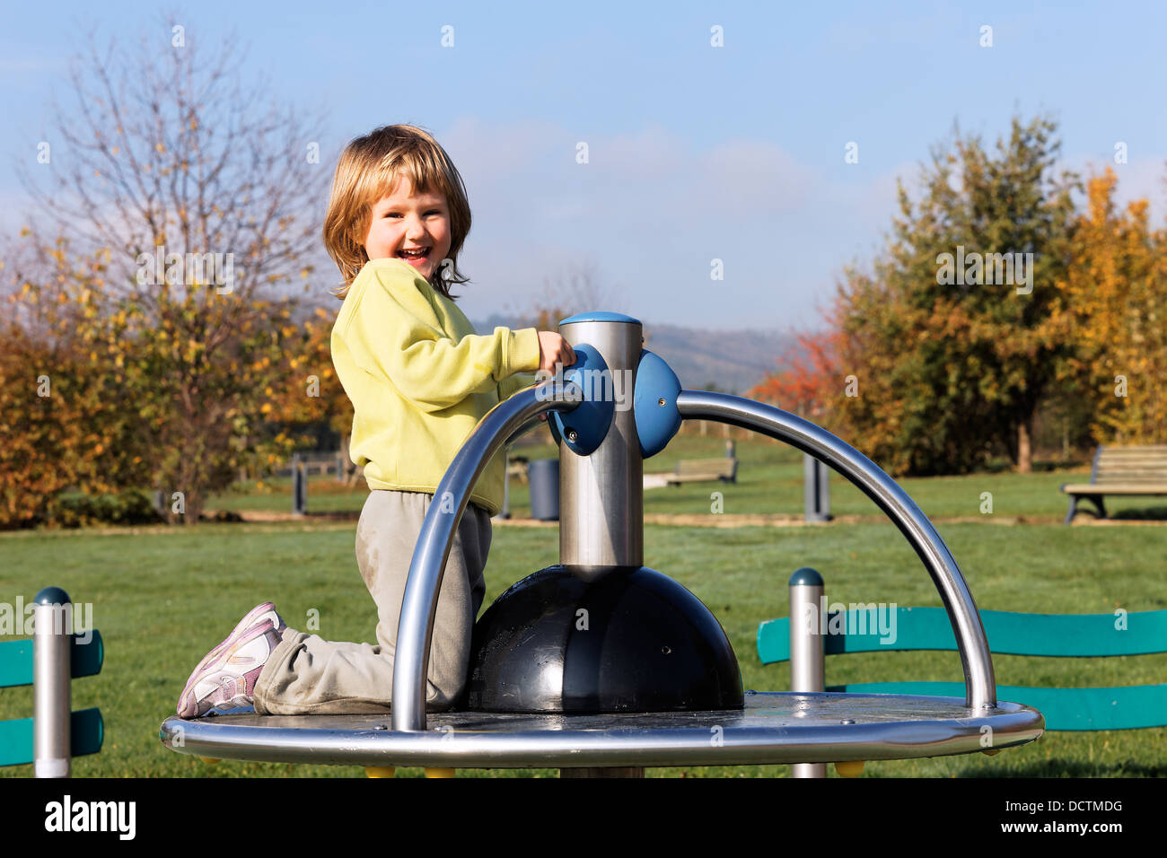 child playing on playground Stock Photo - Alamy