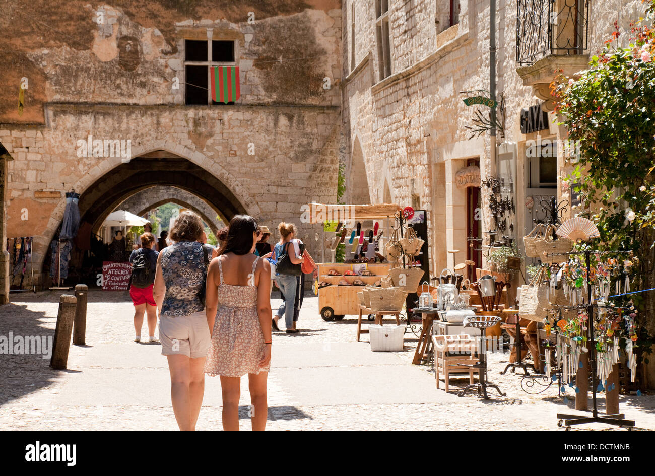 Street scene in Monpazier, a french bastide village in the Dordogne ...