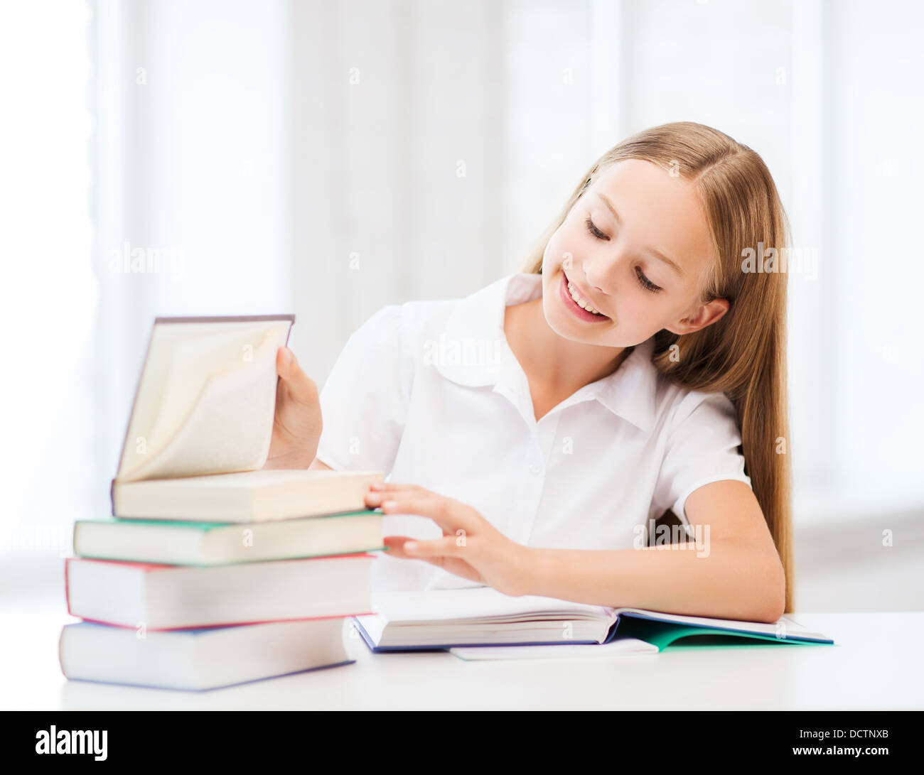 student girl studying at school Stock Photo - Alamy