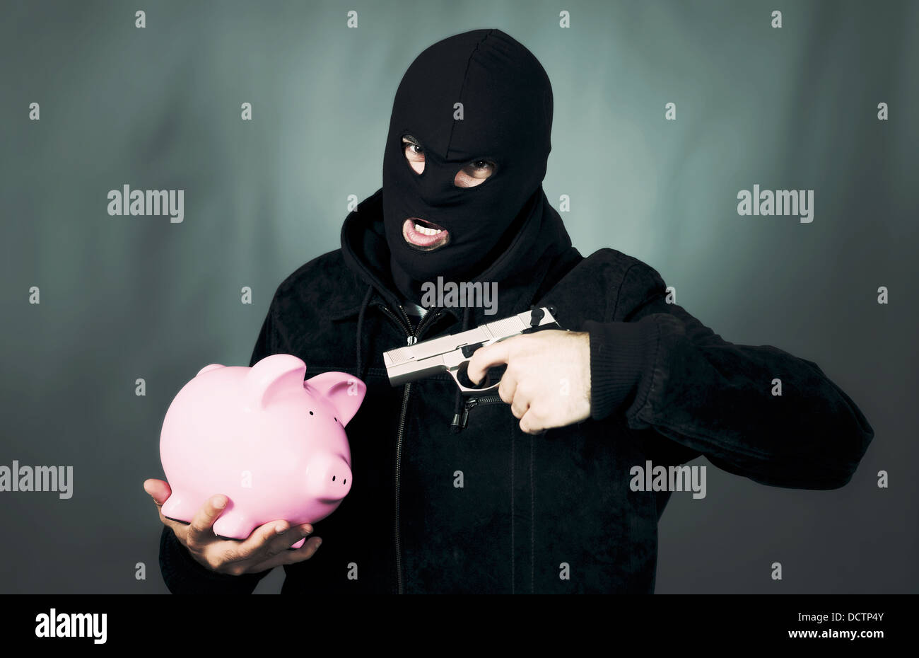 Bank robber hand gun hi-res stock photography and images - Alamy