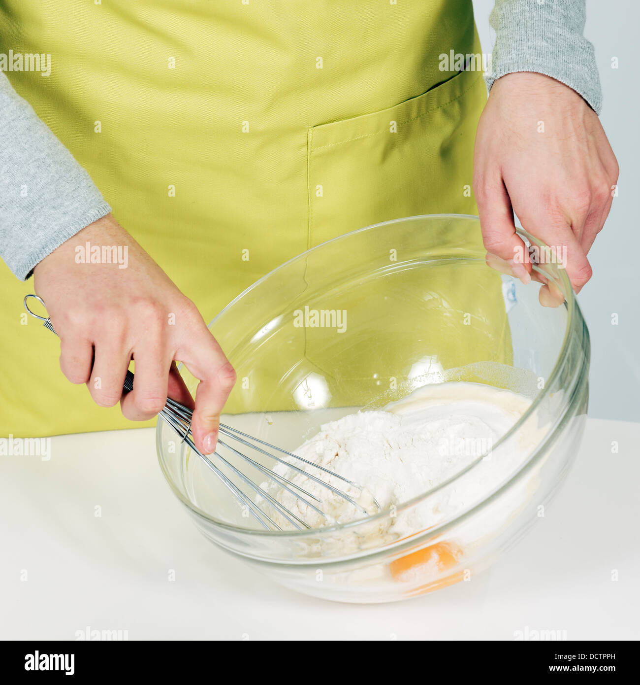 whisking batter in kitchen Stock Photo - Alamy