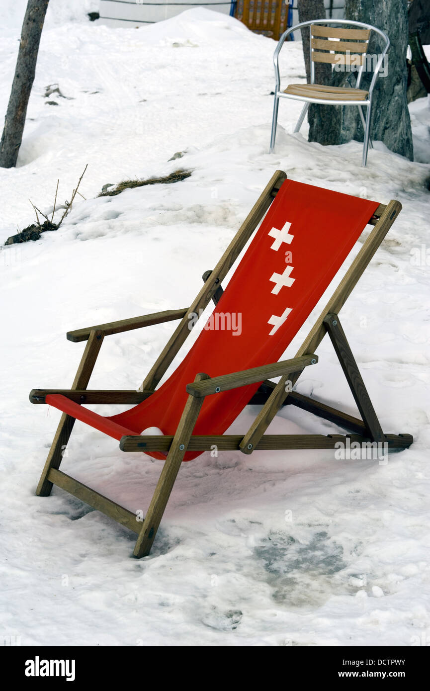 Red beach chair, Savognin, Switzerland Stock Photo - Alamy