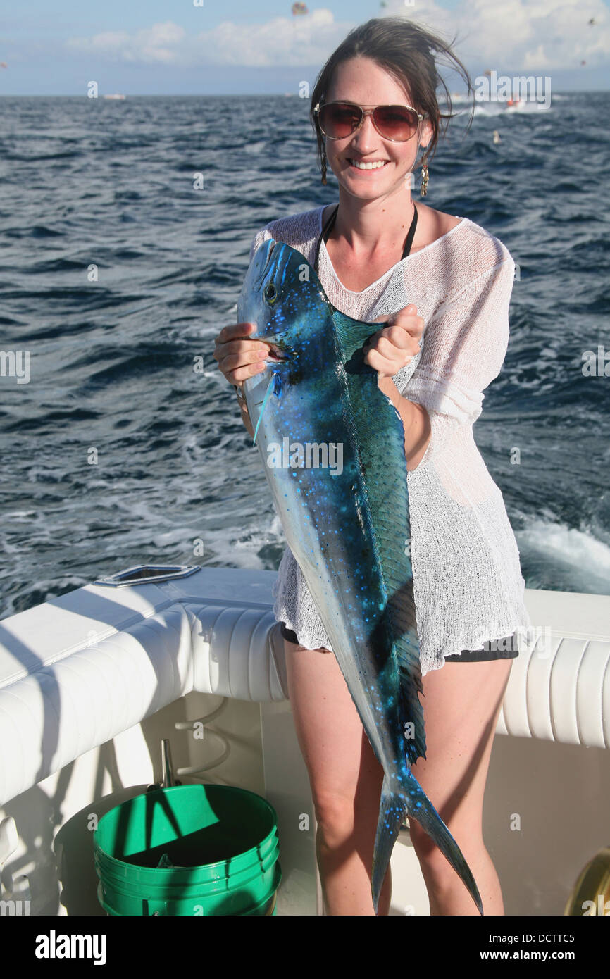 Woman Holding Newly Caught Fish, Cabo San Lucas, Mexico Stock Photo - Alamy