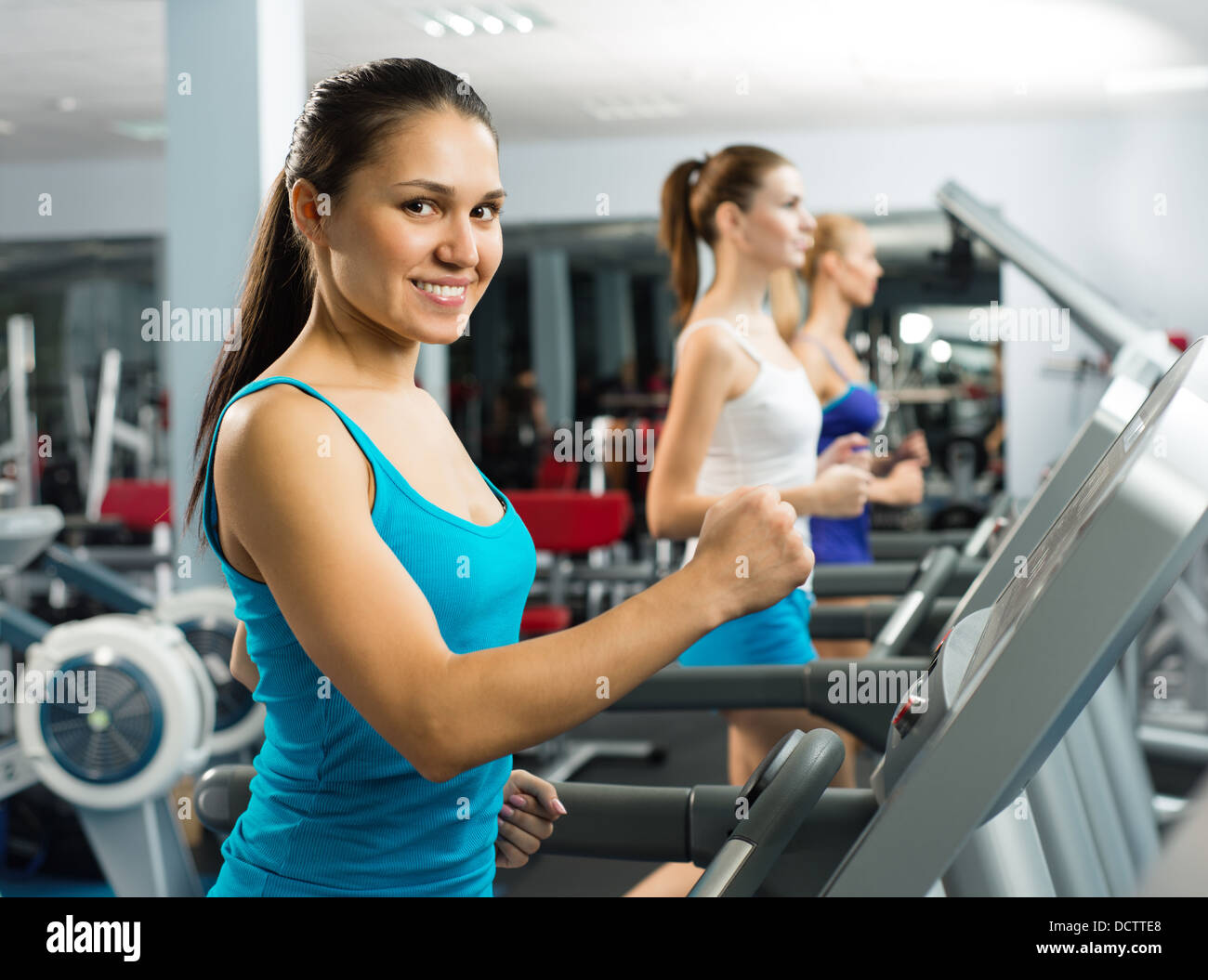 young women running on a treadmill Stock Photo - Alamy