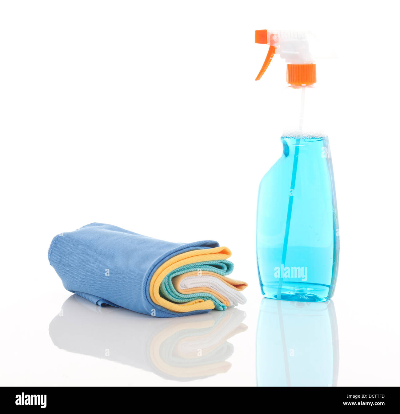 cleaning dusters with bottle cleaning liquid on white Stock Photo - Alamy