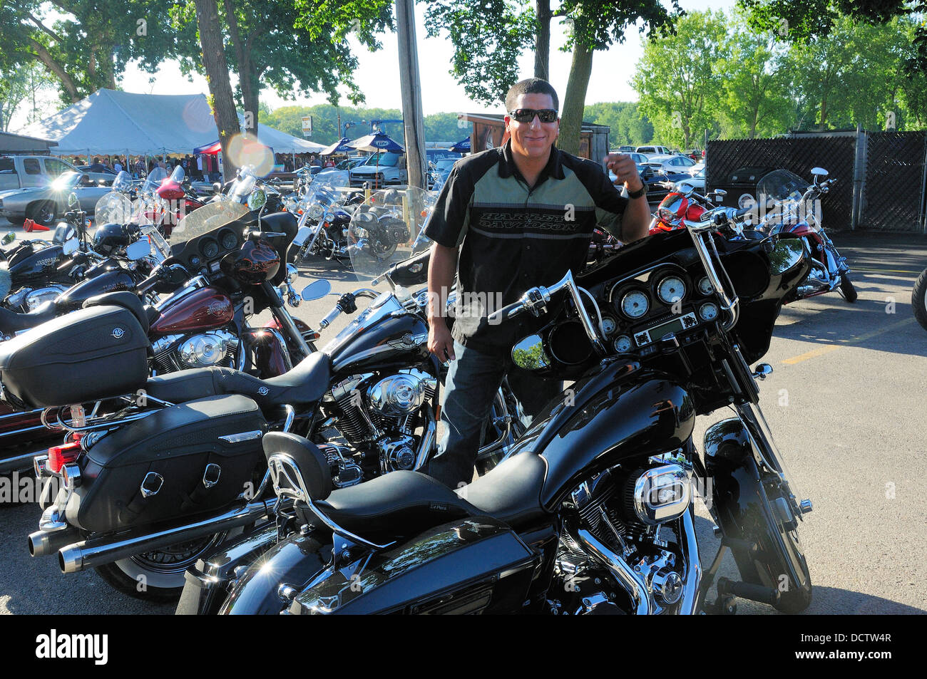 Harley Davidson Motorcycle / s and proud owner Stock Photo - Alamy