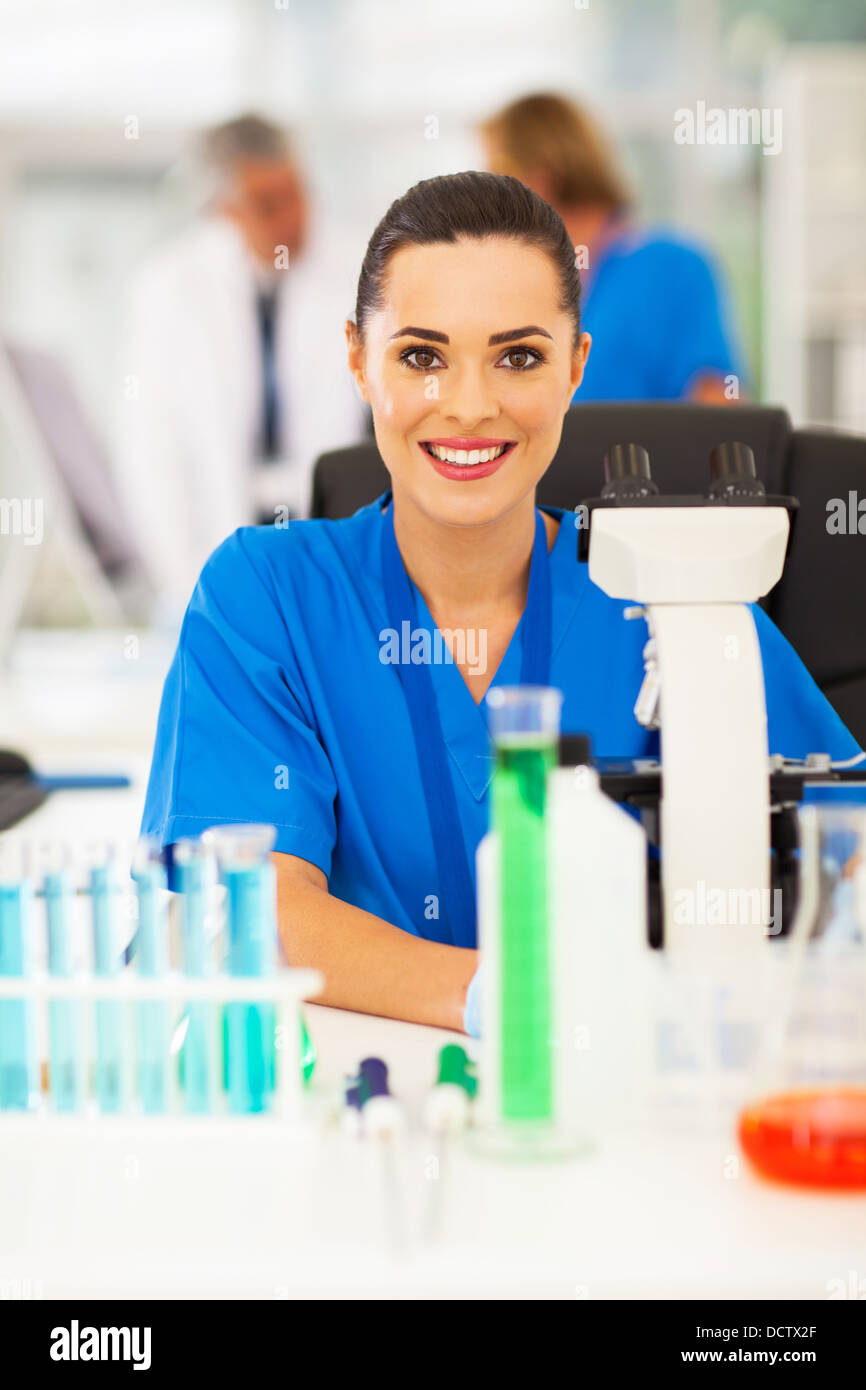 attractive young female medical researcher in lab Stock Photo - Alamy