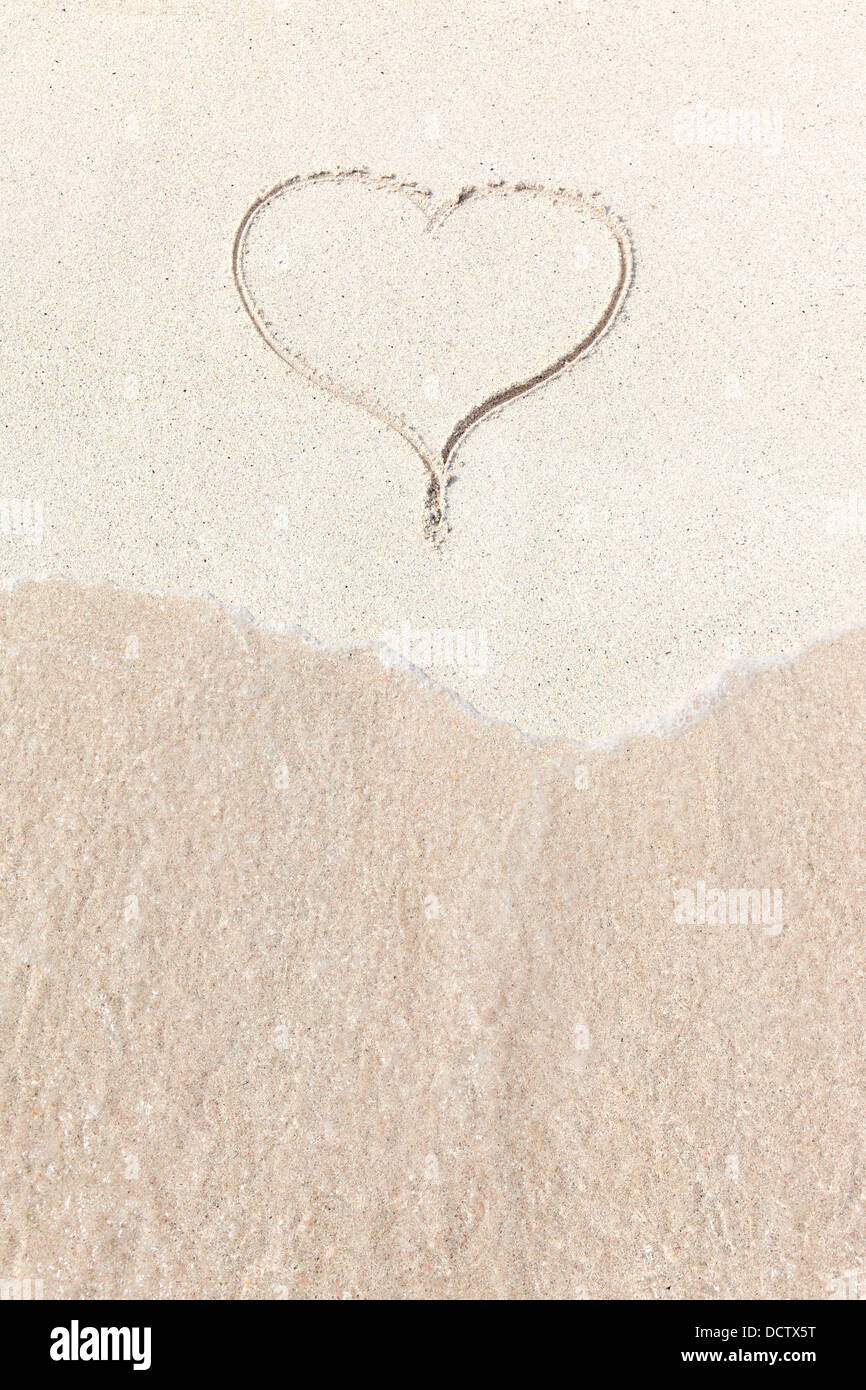 heart on sand Stock Photo - Alamy
