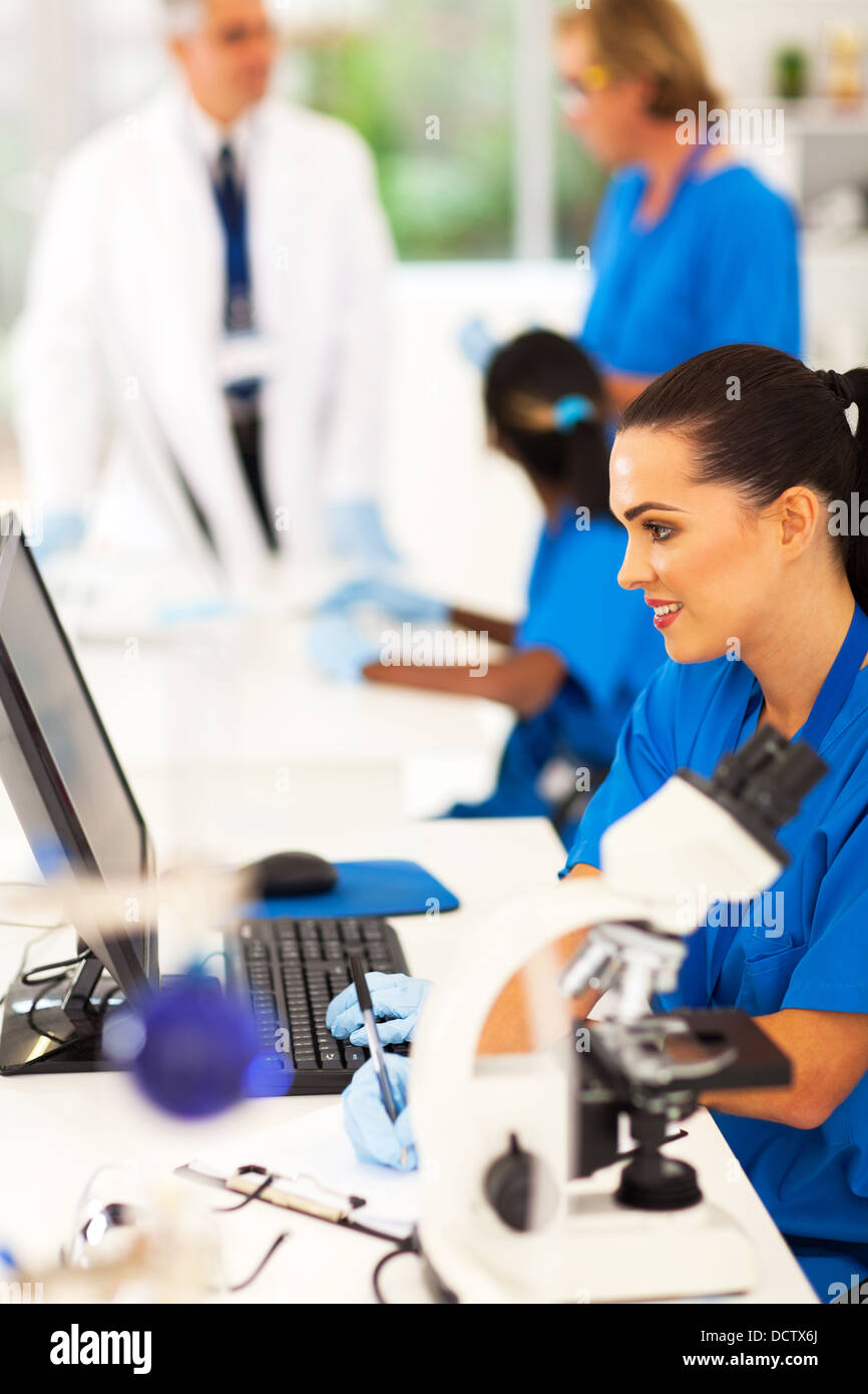 group of lab technicians working in a modern laboratory Stock Photo - Alamy