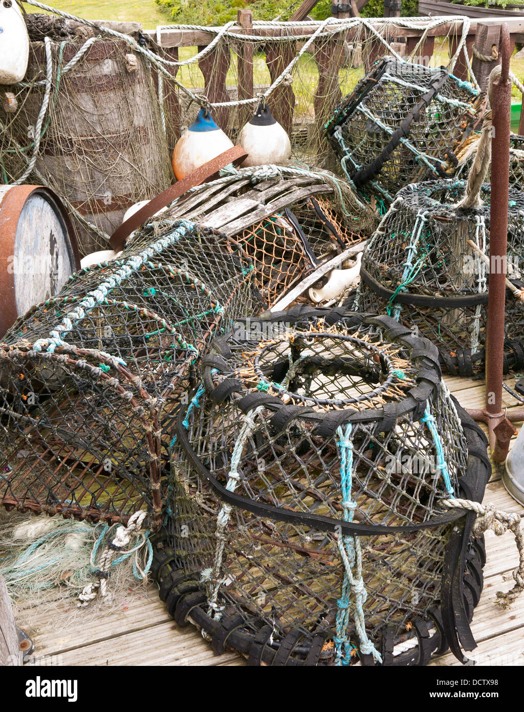 Lobster pots, nets and buoys all heaped together Stock Photo - Alamy