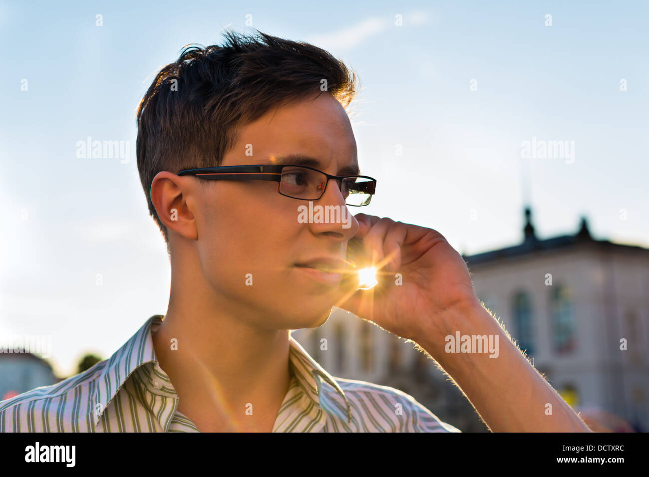 Man taking a call with mobile phone or Smartphone and looking seriously ...
