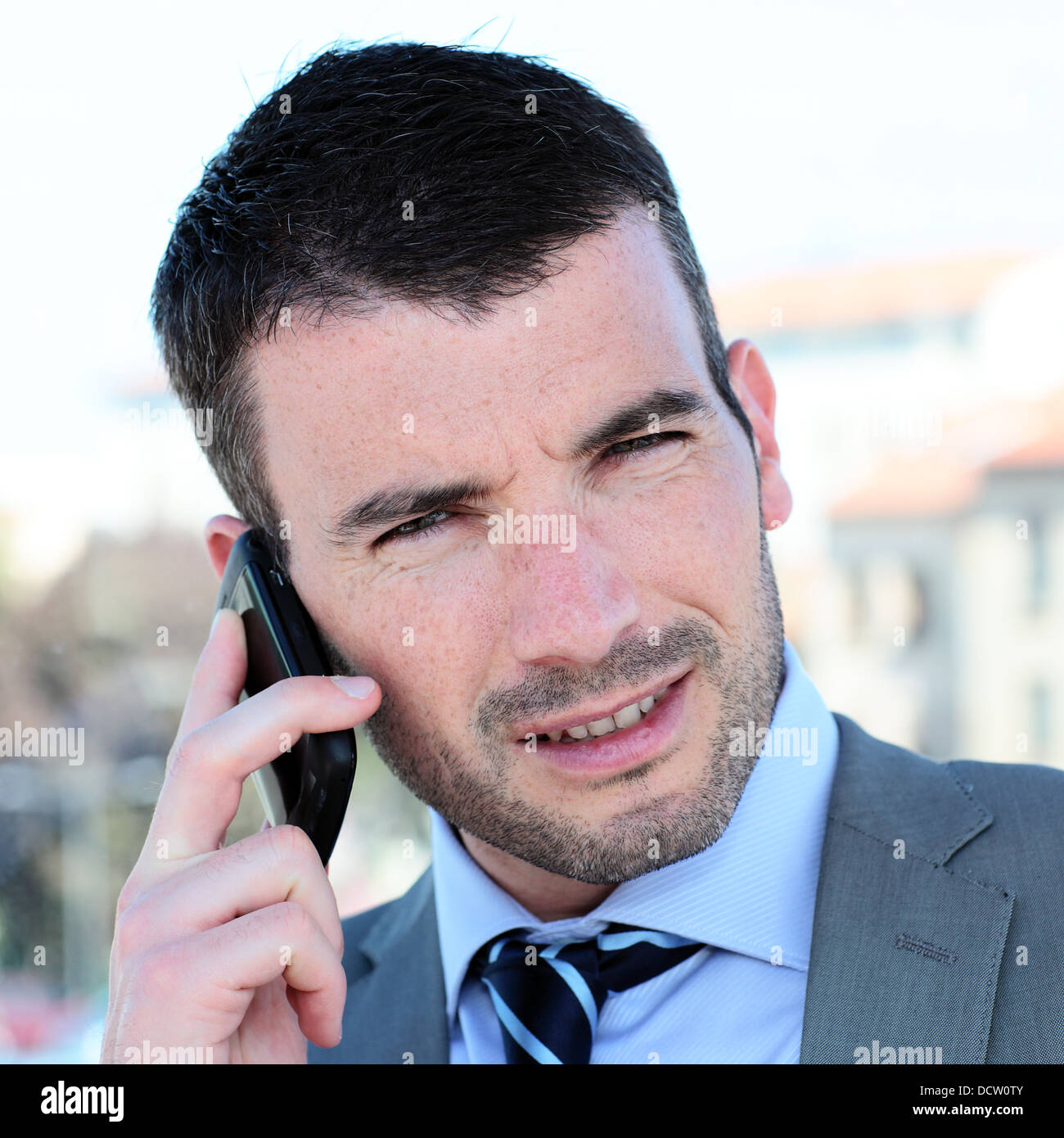on the phone square Stock Photo - Alamy