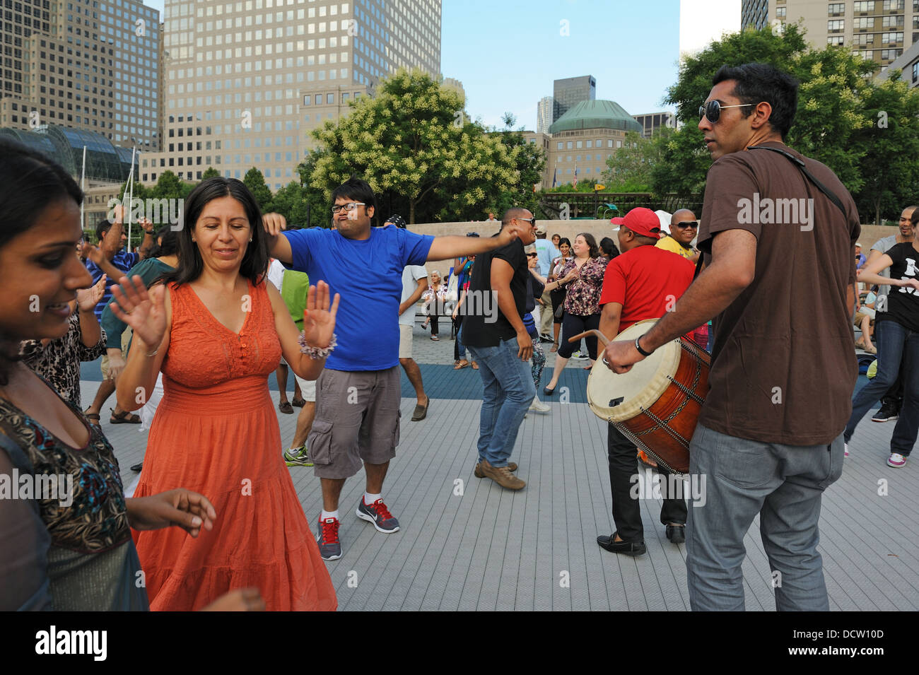 Dancing to bhangra music from Punjab at an East Indian family dance in ...
