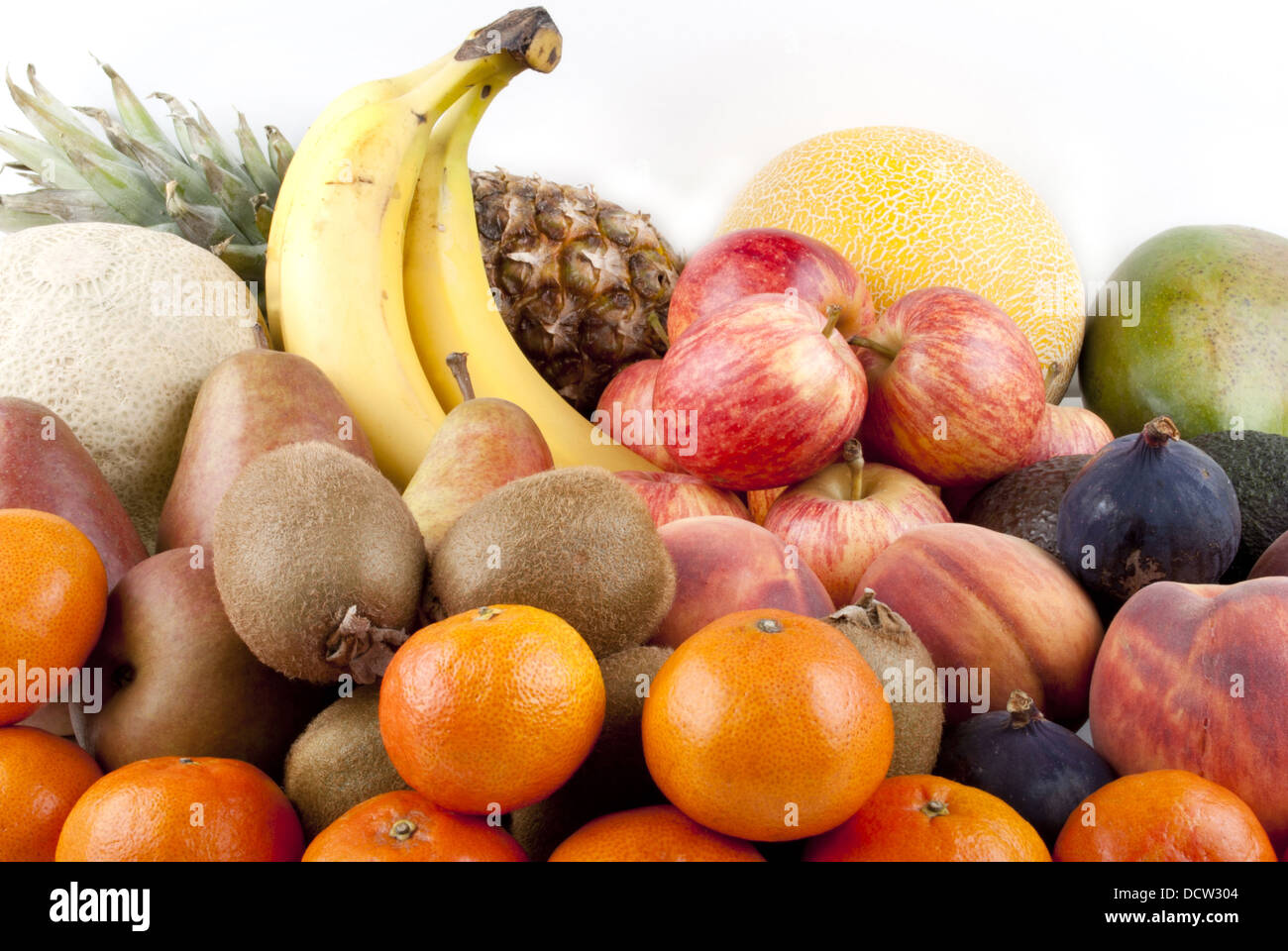 various fresh fruit and a light background Stock Photo - Alamy