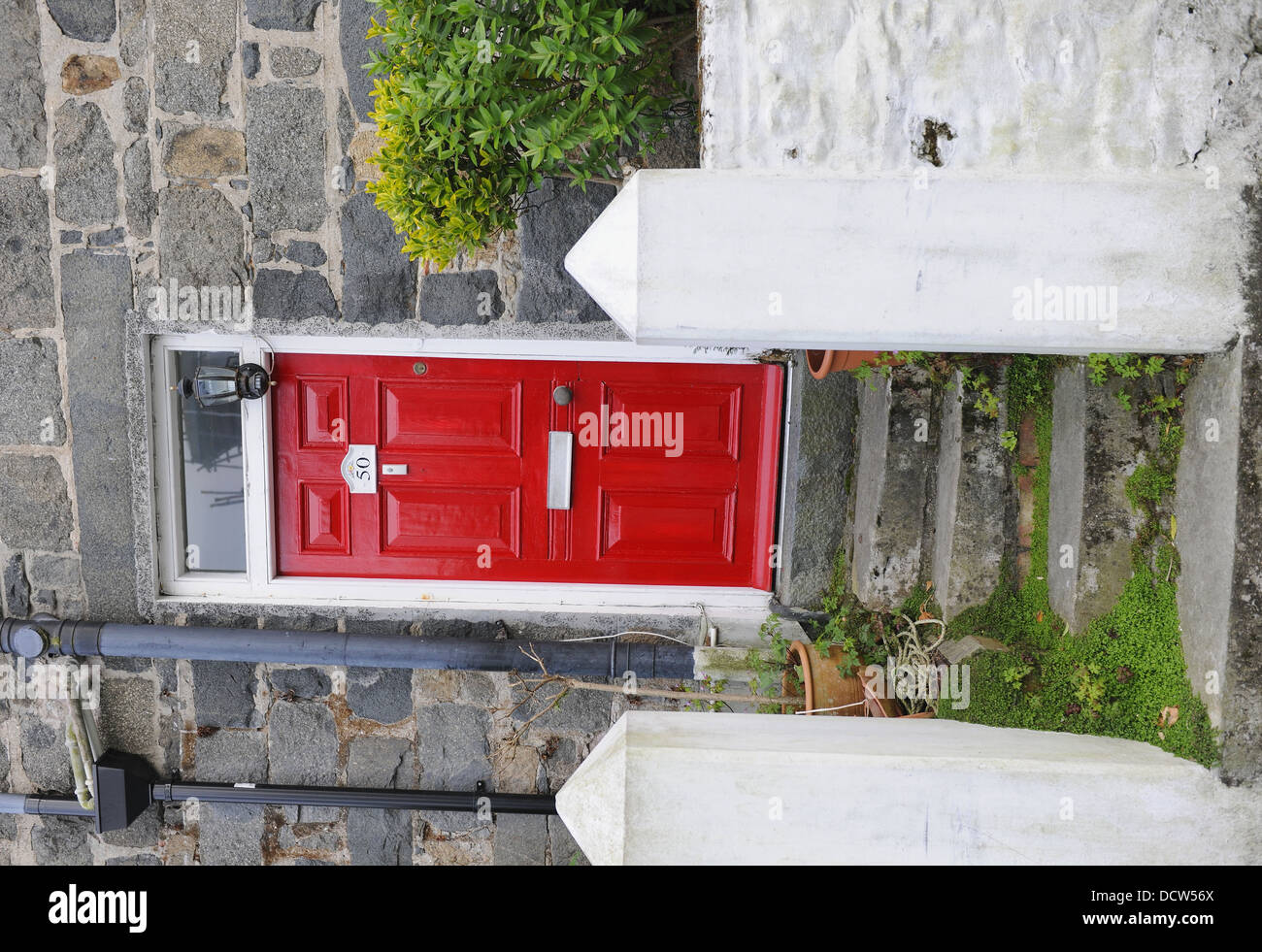 Red door and steps Stock Photo - Alamy