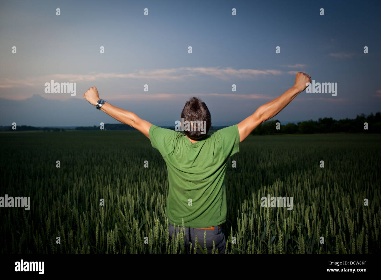 Young man enjoying his freedom/rejoicing from his success Stock Photo ...