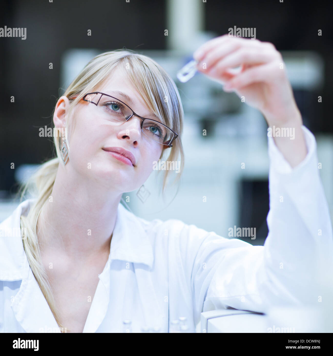 portrait of a female researcher/chemistry student carrying out r Stock ...