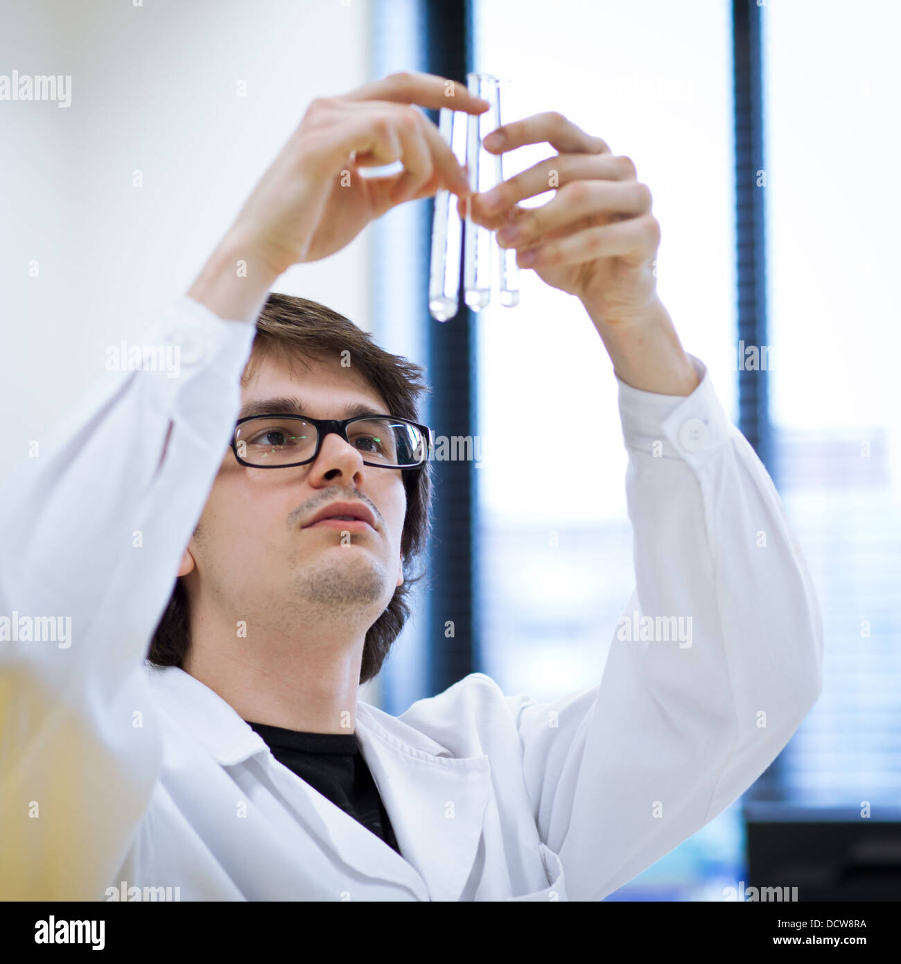 young, male researcher/chemistry student Stock Photo - Alamy