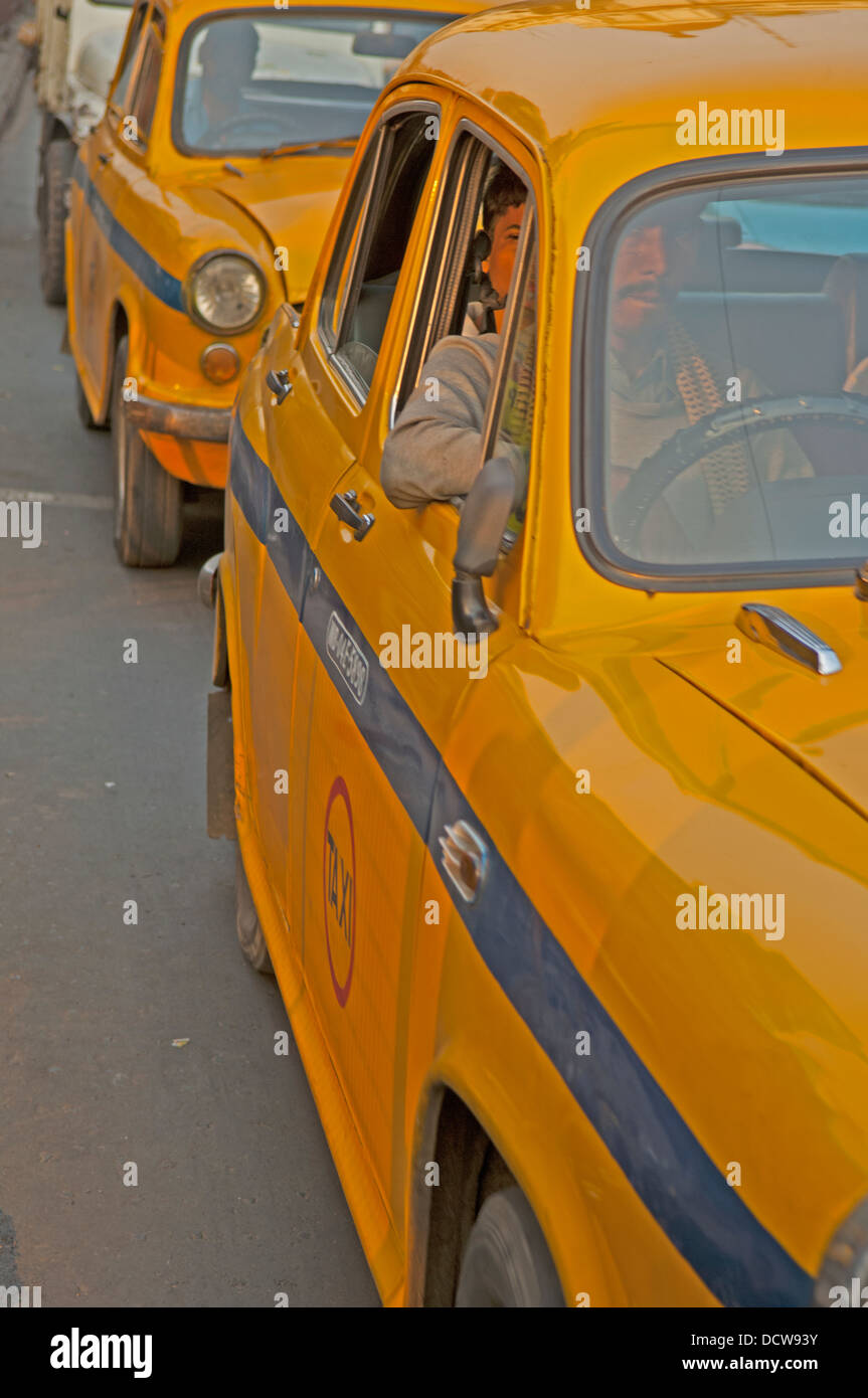 two yellow taxis in the street, kolkata, india Stock Photo - Alamy