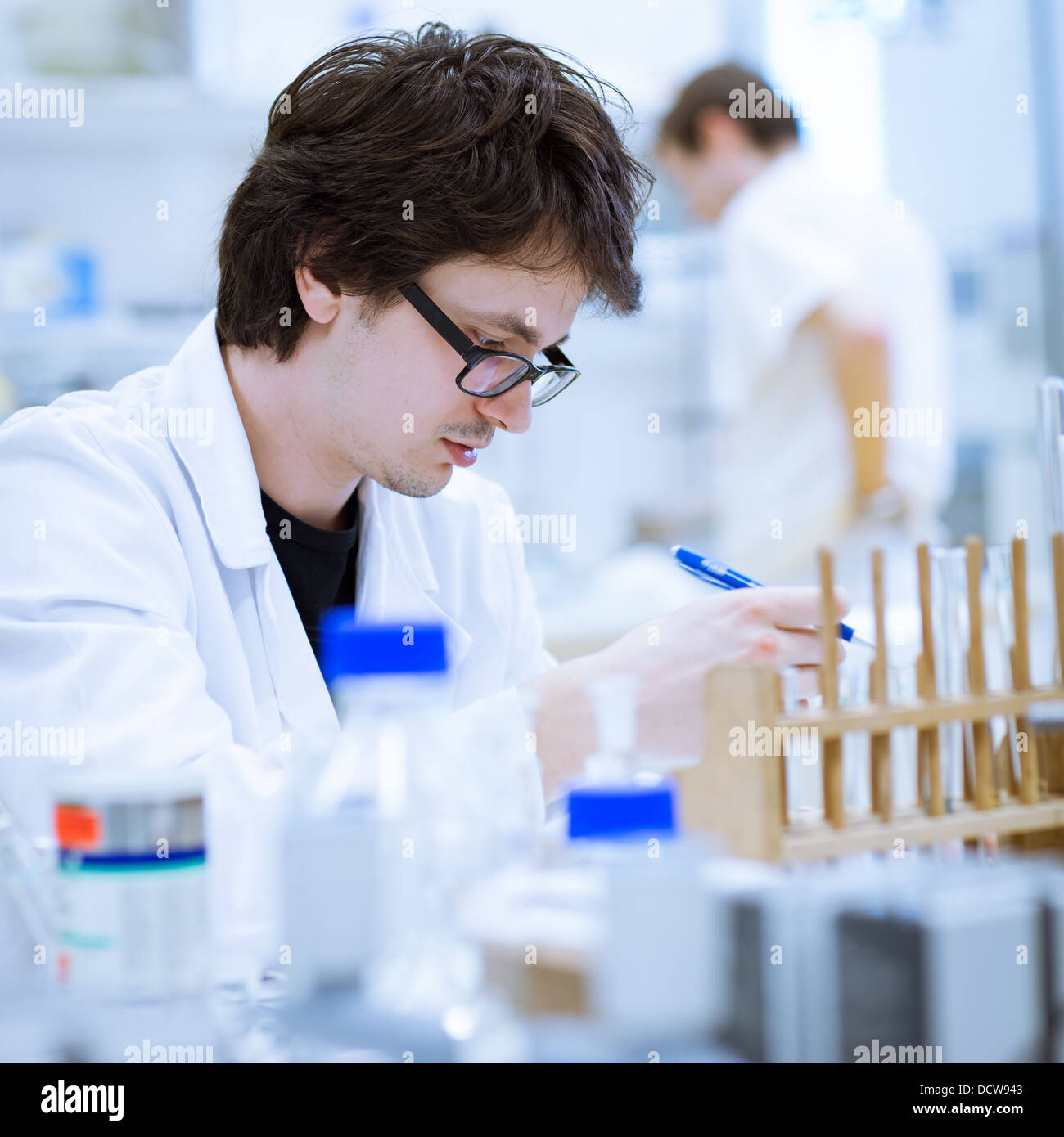 young, male researcher/chemistry student Stock Photo - Alamy