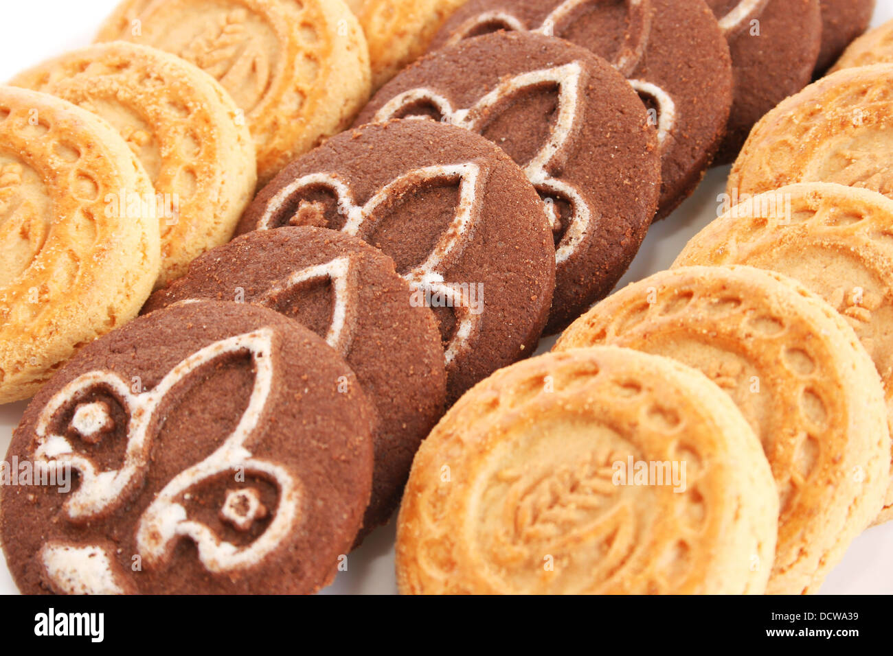 Cookies with pattern on plate isolated on white background Stock Photo ...