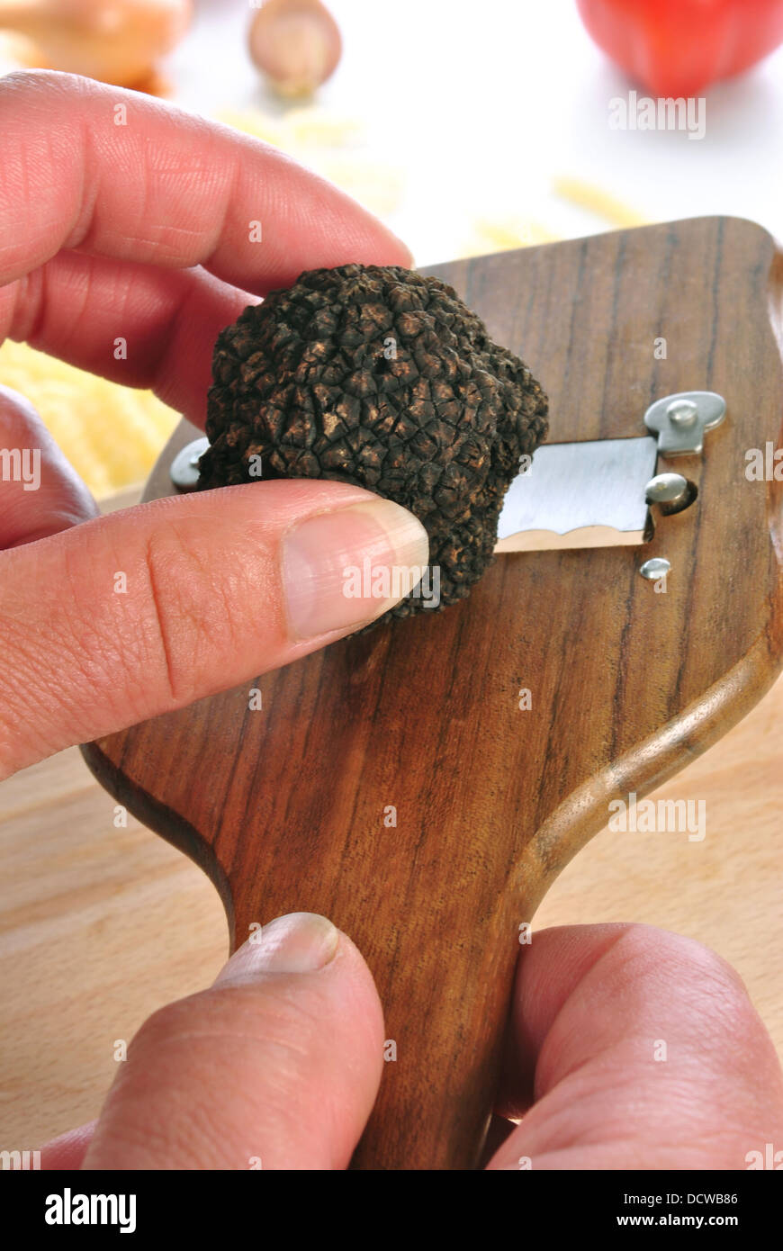 summer truffle is prepared with a truffle slicer Stock Photo - Alamy