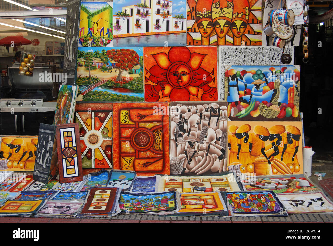 Brightly coloured Paintings for sale in the street, Santo Domingo ...