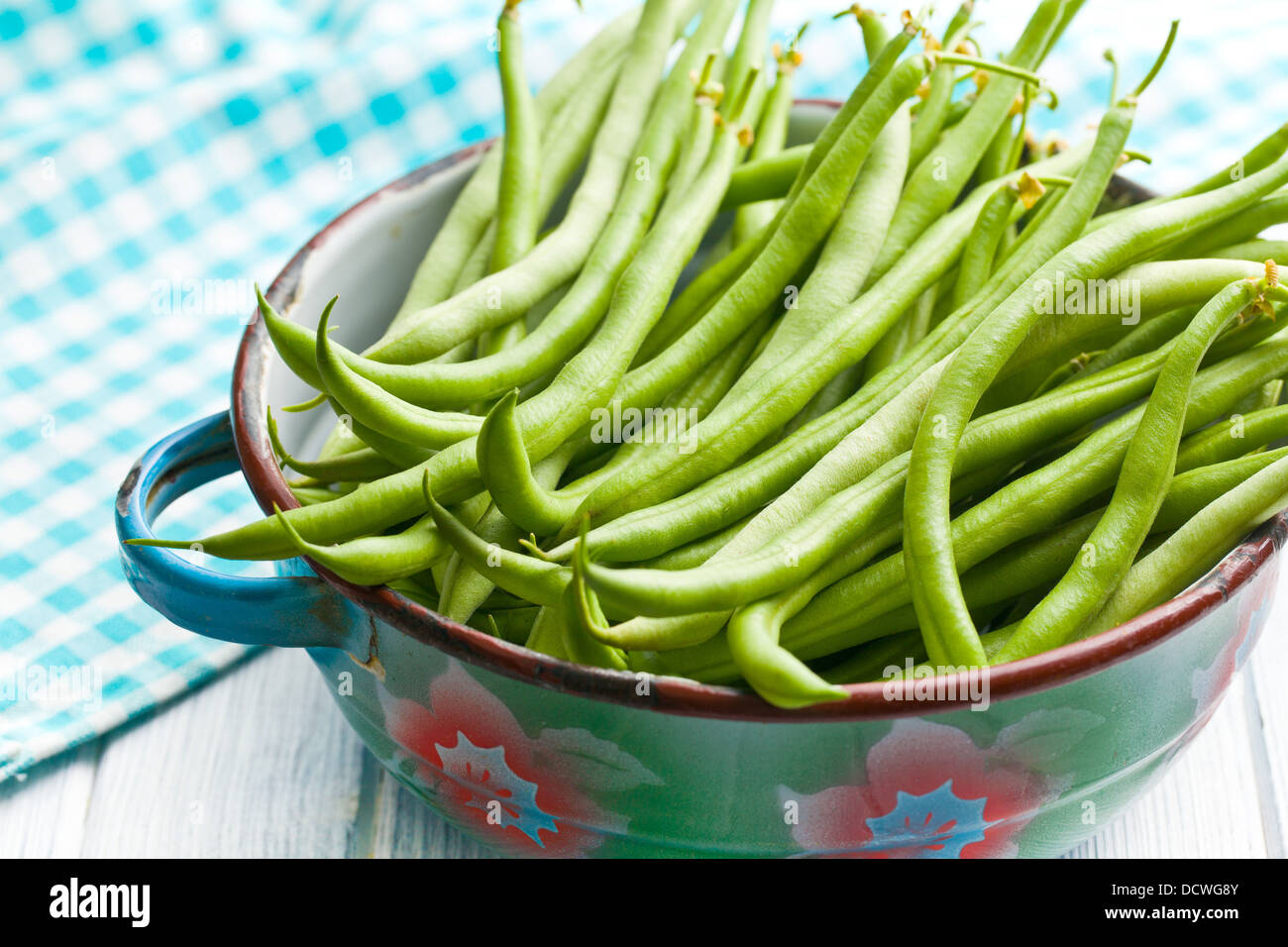 the green beans on kitchen table Stock Photo - Alamy