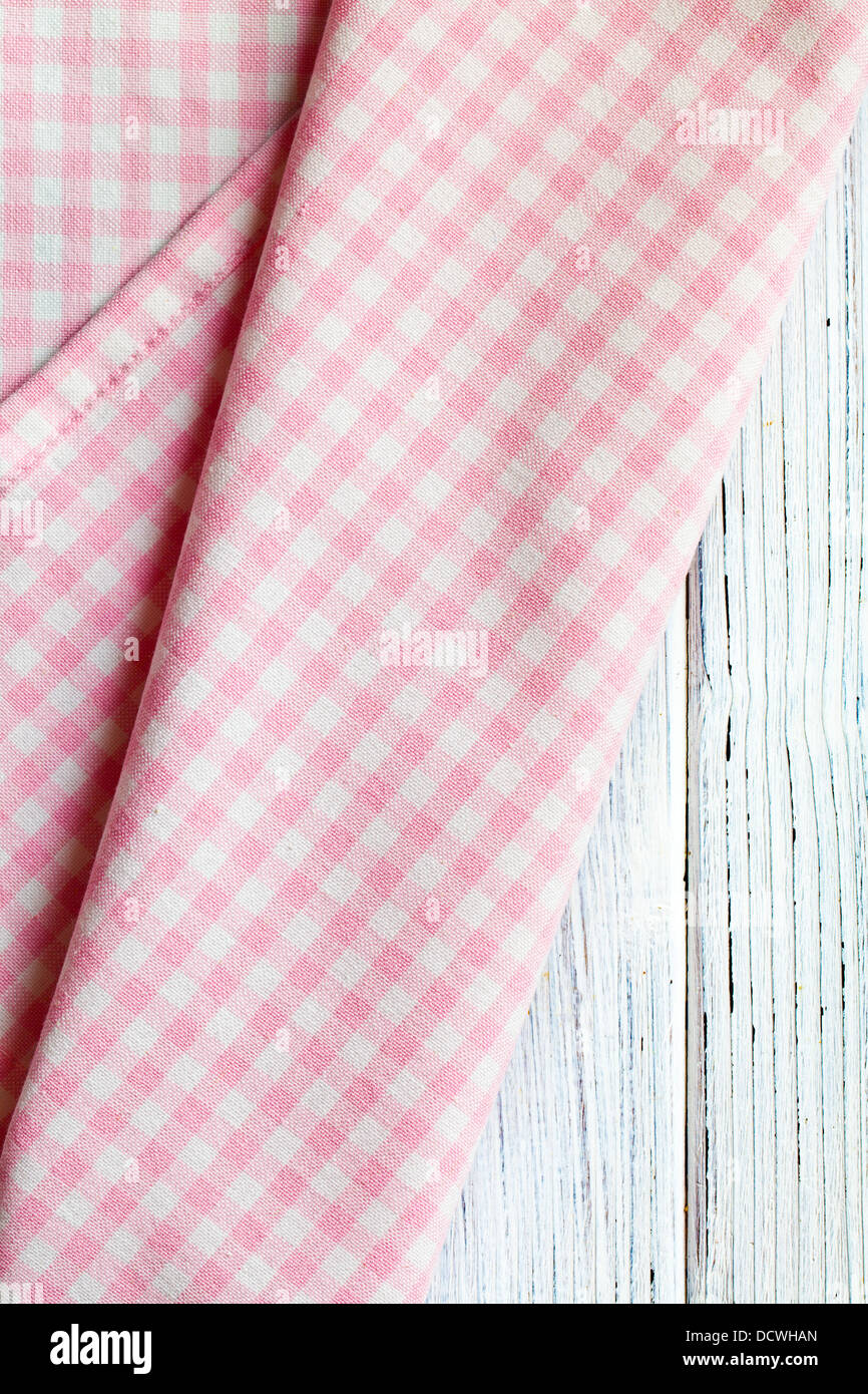 the checkered napkin on white wooden table Stock Photo - Alamy